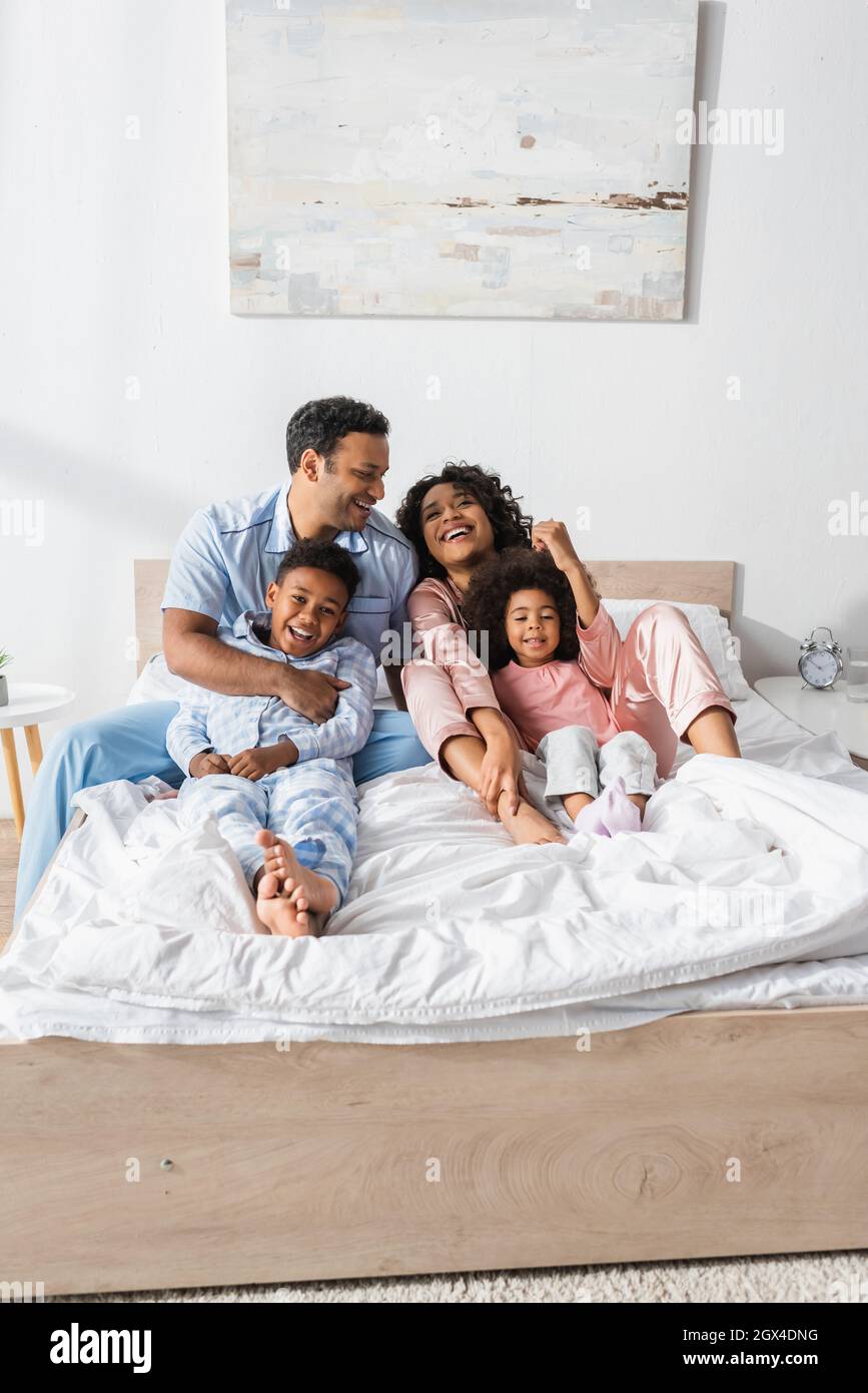 Kids hugging afro hi-res stock photography and images - Alamy