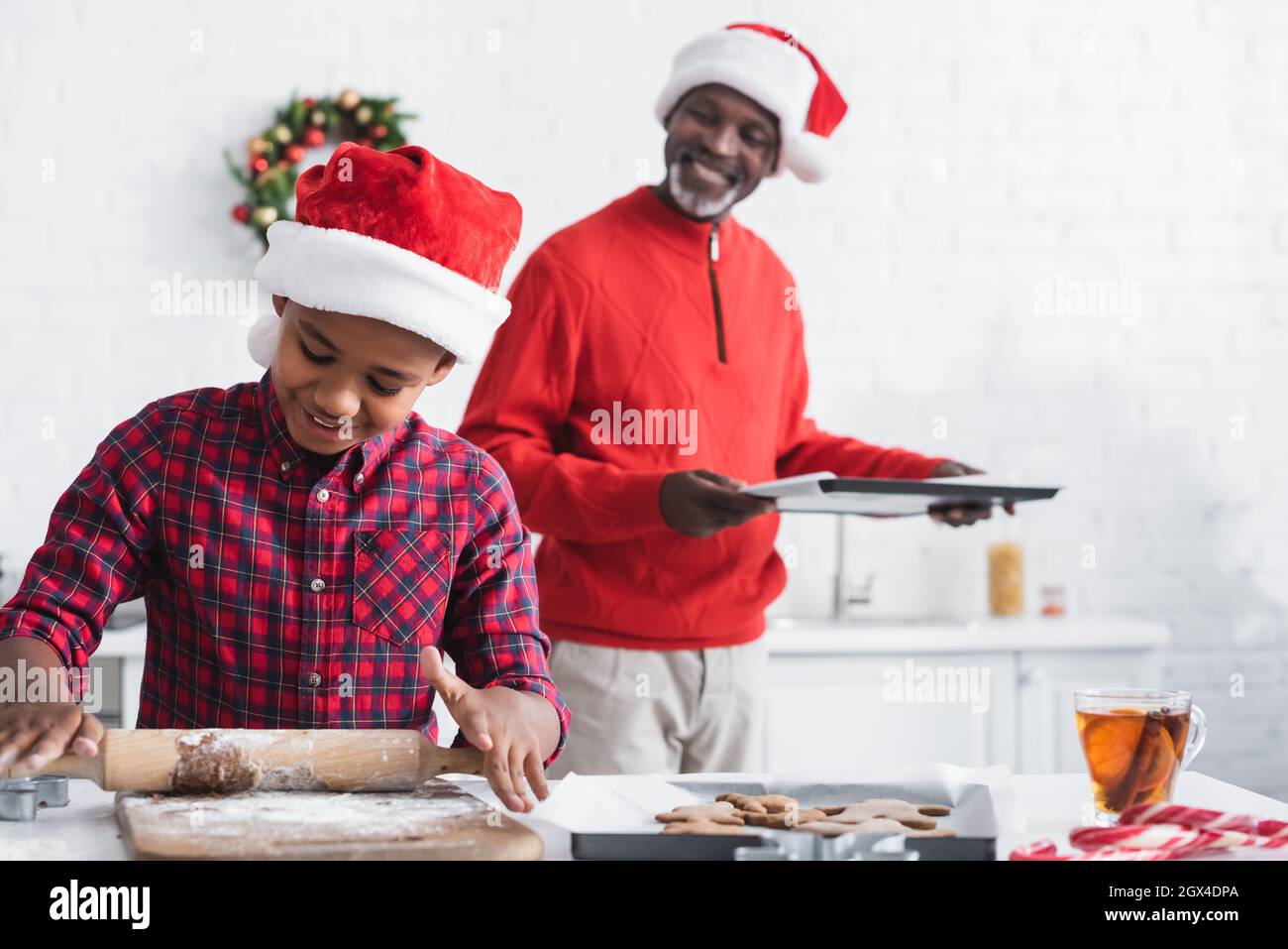 Black boy baking hi-res stock photography and images - Alamy