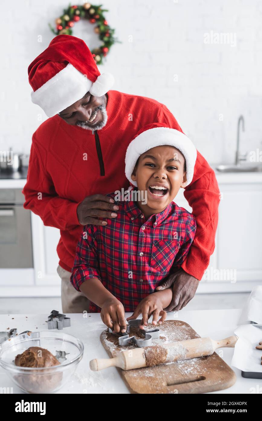 Black boy cooking in the kitchen hi-res stock photography and images ...