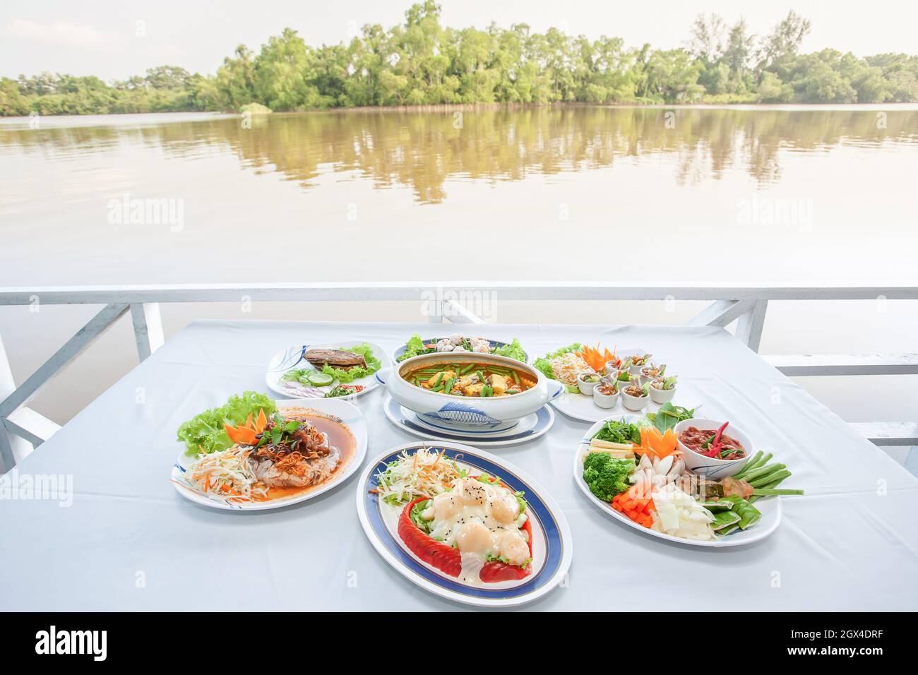 Asian cuisine set, Japanese shrimps with salad, fish organs sour soup ...