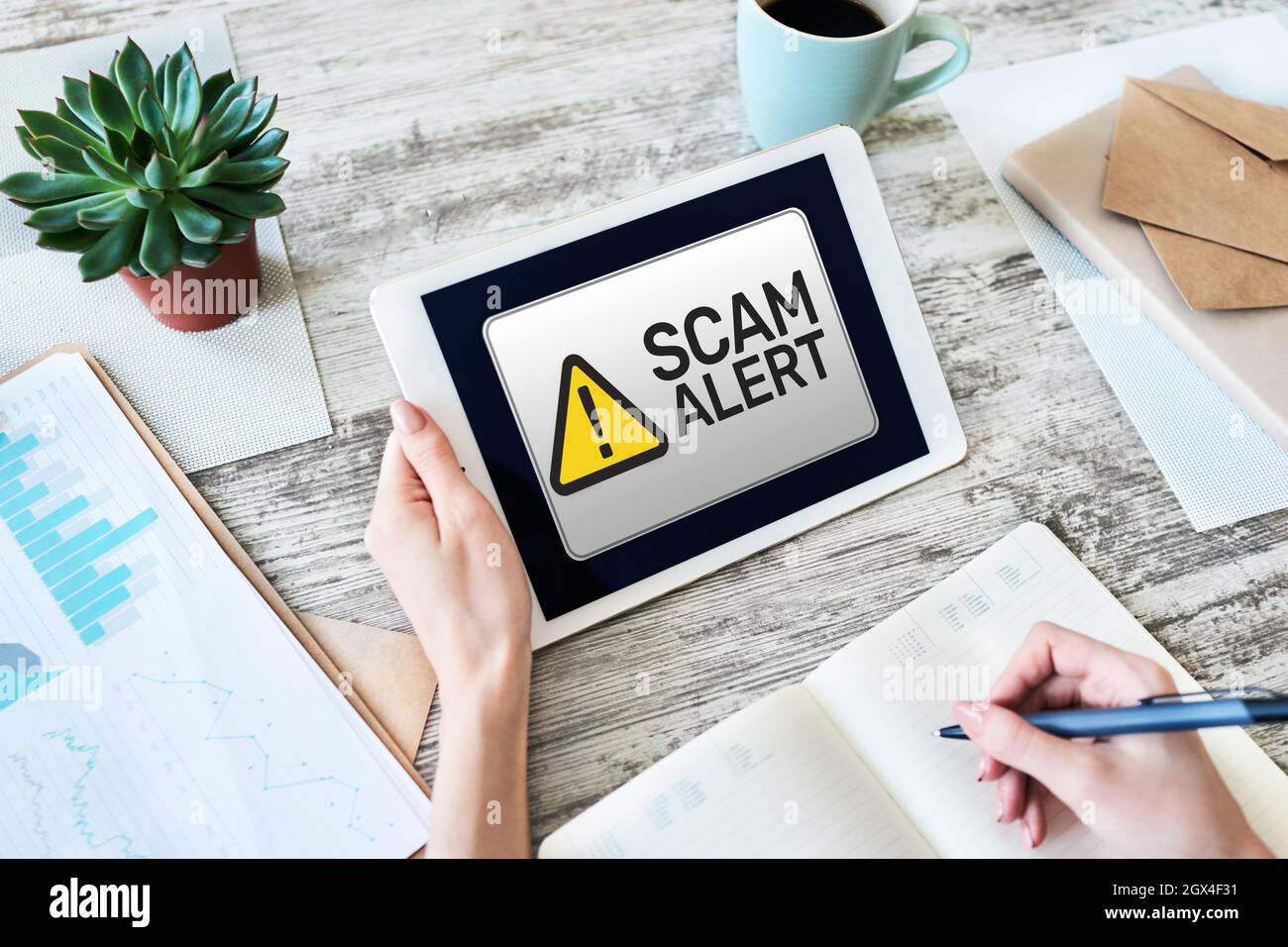 Scam alert detecting warning. Notification on device screen Stock Photo ...