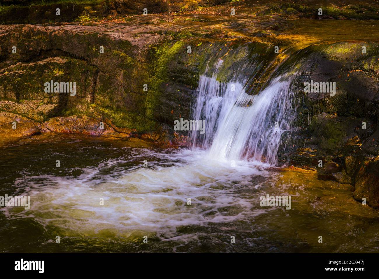 Sqwd Isaf Clun-Gwyn Waterfall , Brecon Beacons Stock Photo - Alamy