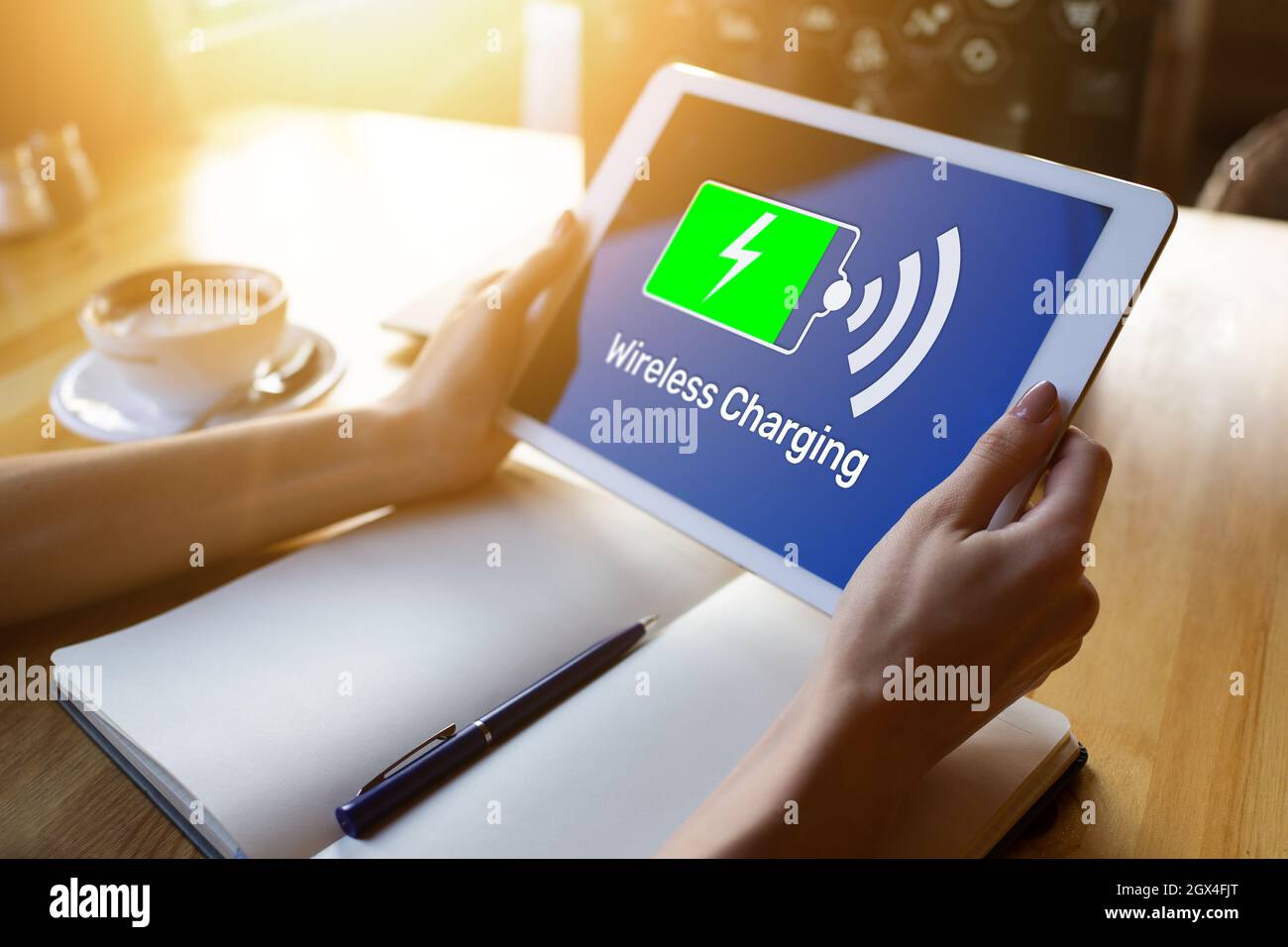 Wireless charging icons and progress bar on device screen Stock Photo ...