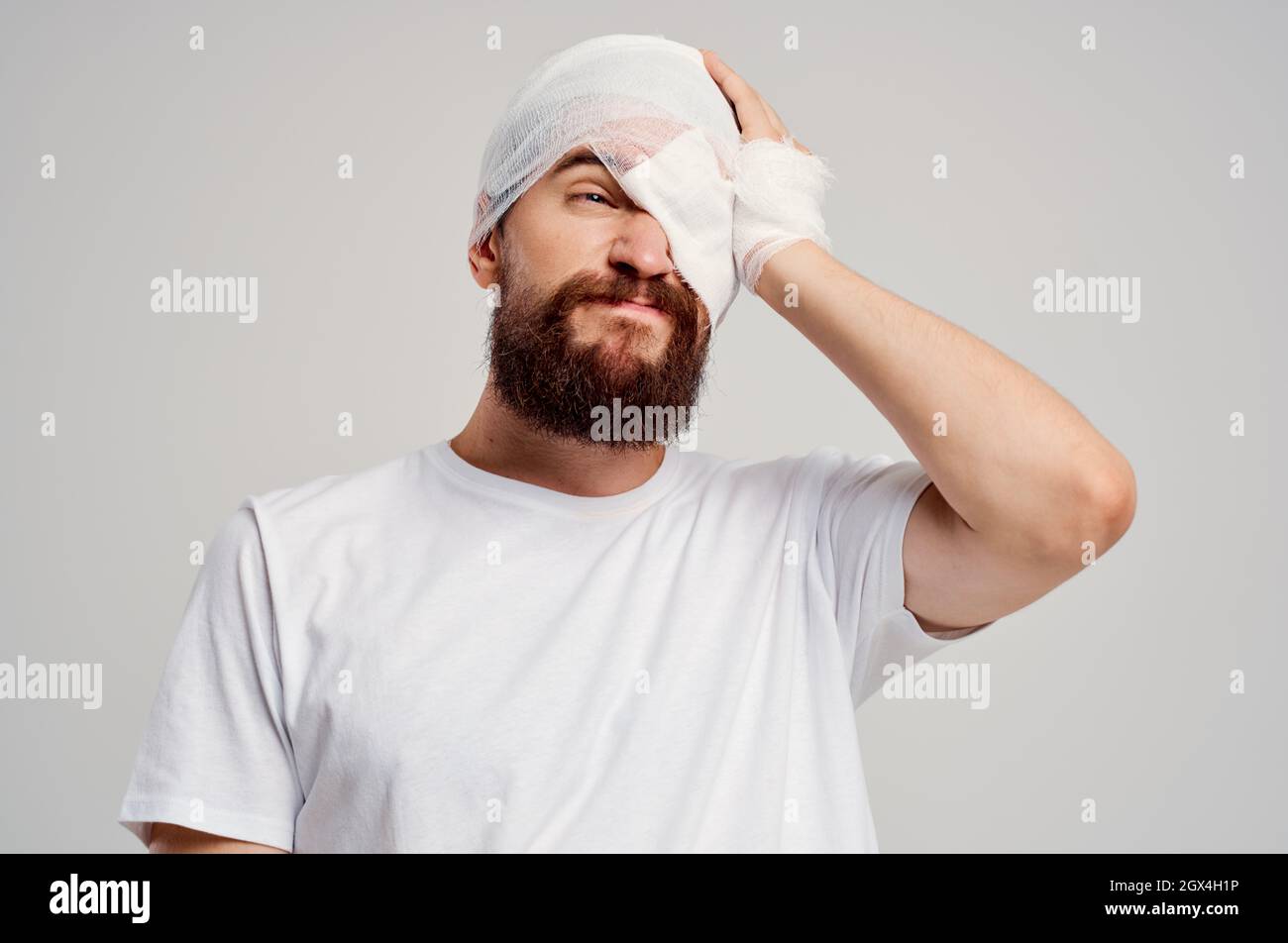 patient in a white t-shirt trauma health diagnosis light background ...