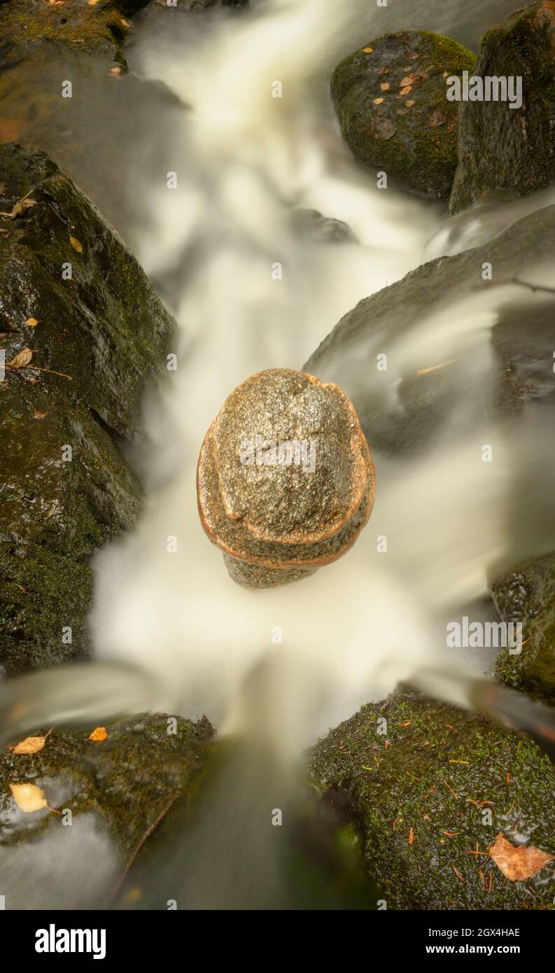 rock laying in an waterfall Stock Photo - Alamy