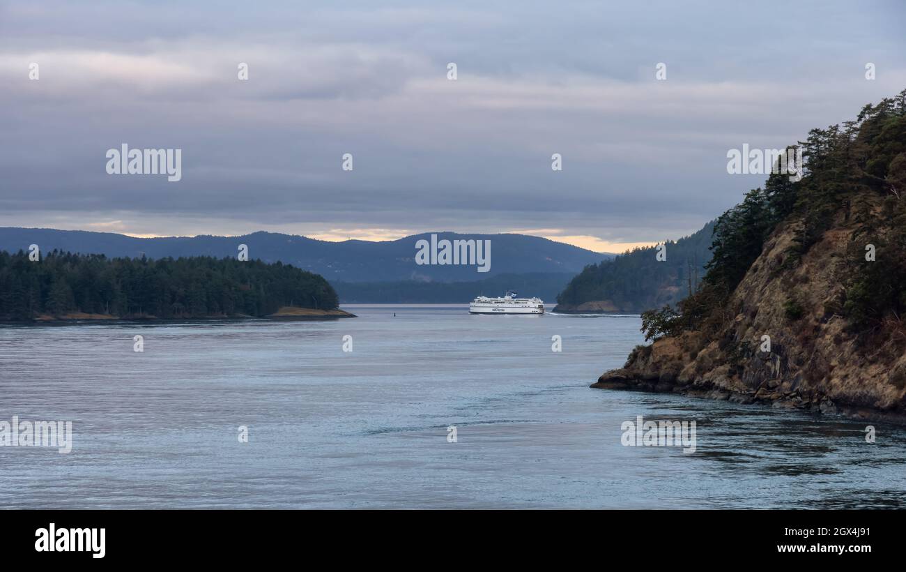 BC Ferries Boat in Pacific Ocean during cloudy summer morning sunrise ... BC Ferries Boat in Pacific Ocean during cloudy summer morning sunrise ...