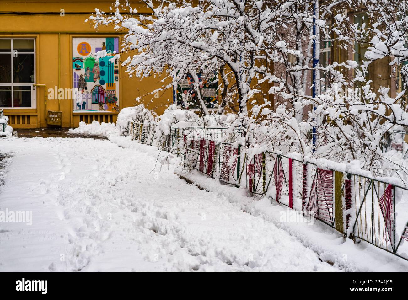 BUCHAREST, ROMANIA - Jan 19, 2021: A snowy street in Bucharest, Romania ...