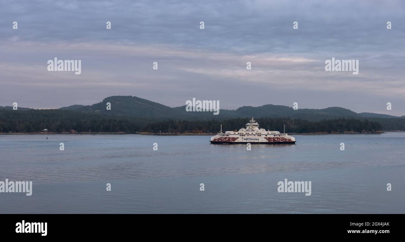 BC Ferries Boat in Pacific Ocean during cloudy summer morning sunrise ... BC Ferries Boat in Pacific Ocean during cloudy summer morning sunrise ...