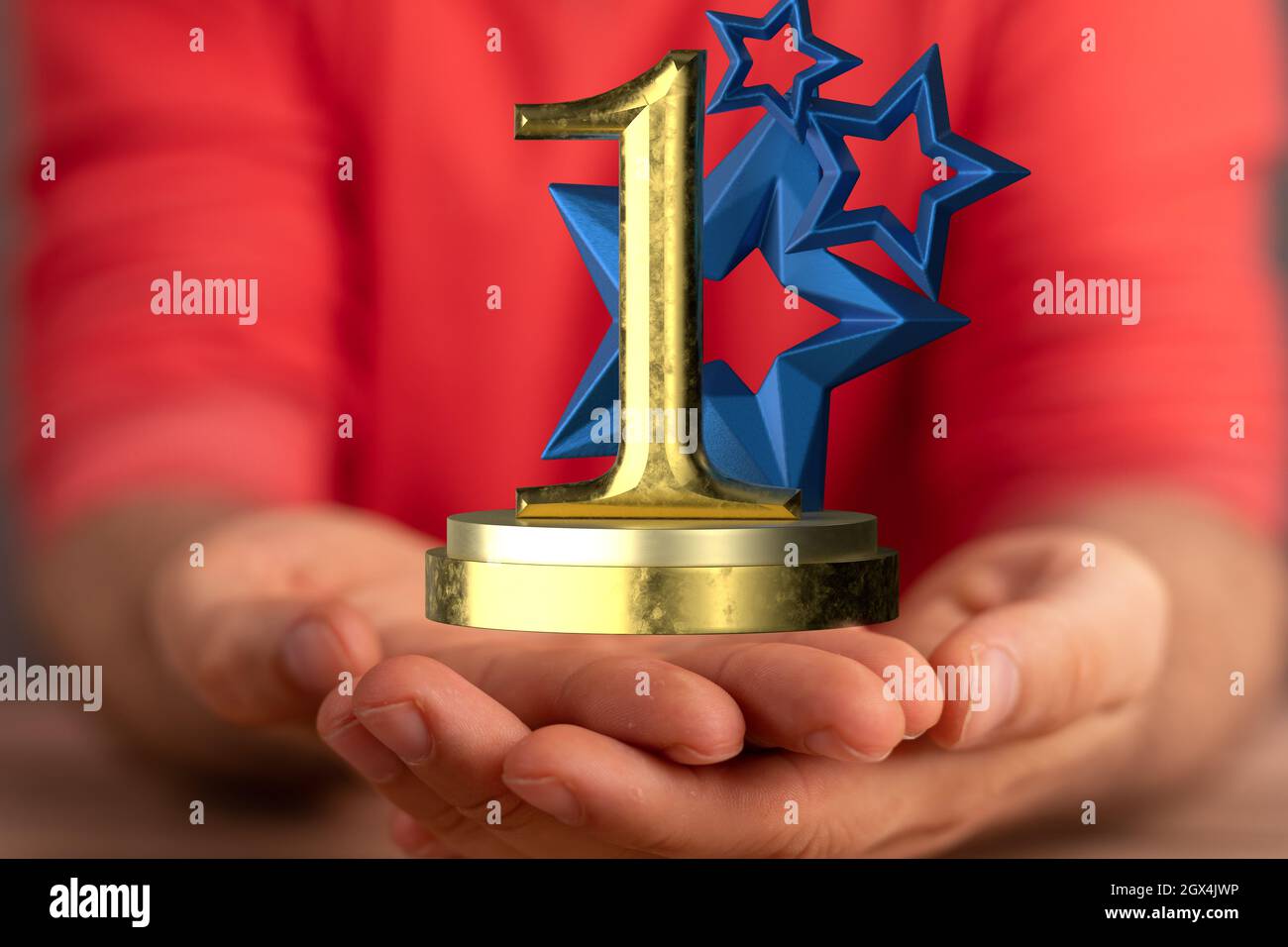 Man's hands showing a 3D rendered gold 1st place, winner's prize Stock ...