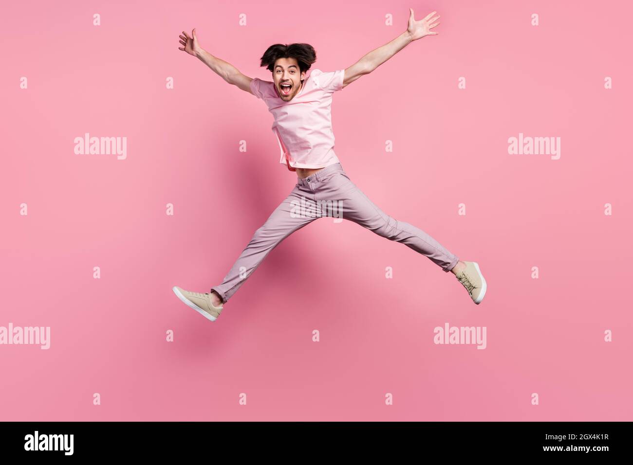 Full body photo of young excited man happy positive smile jump active ...
