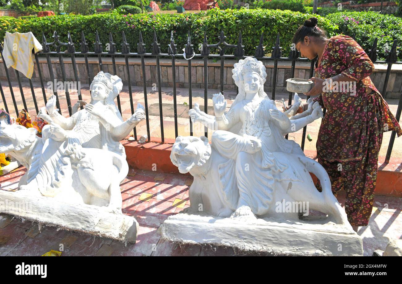 Jaipur, India. 03rd Oct, 2021. An artist prepares an idol of Goddess ...