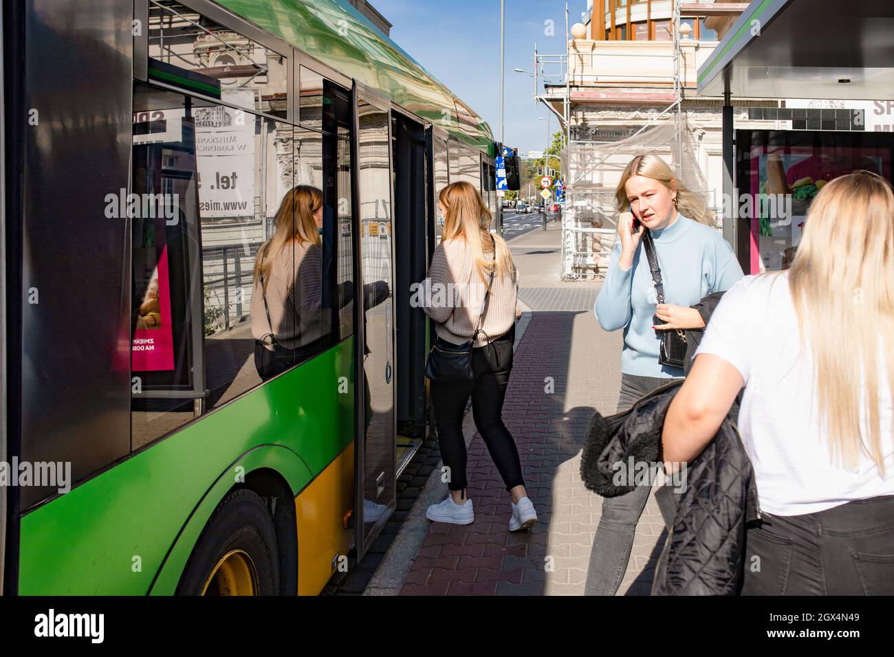 Poznan, Poland - Public transportation - people getting on and off the ...