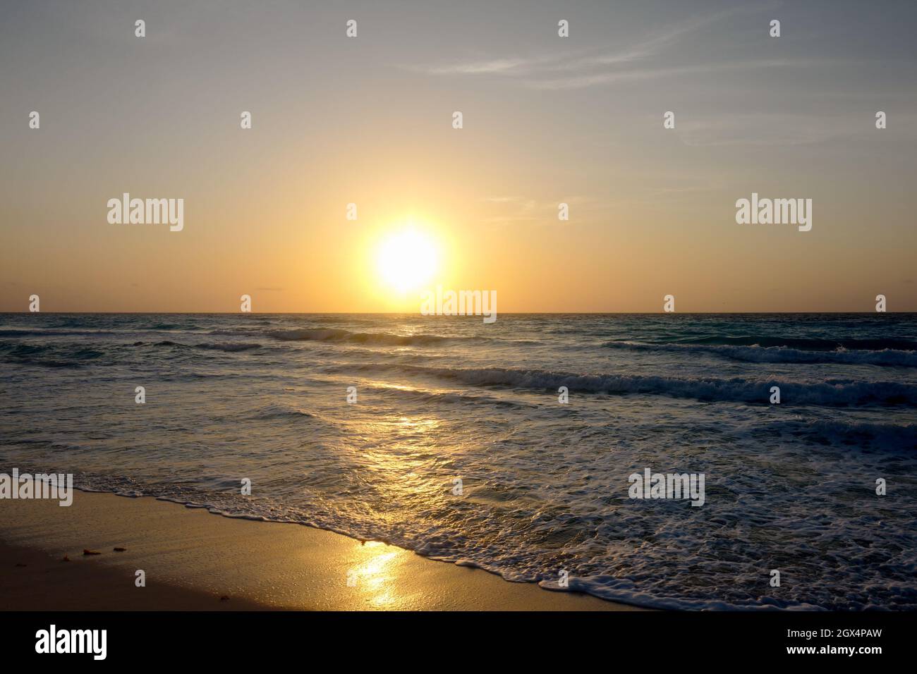 Sandy beach on the sunrise Stock Photo - Alamy