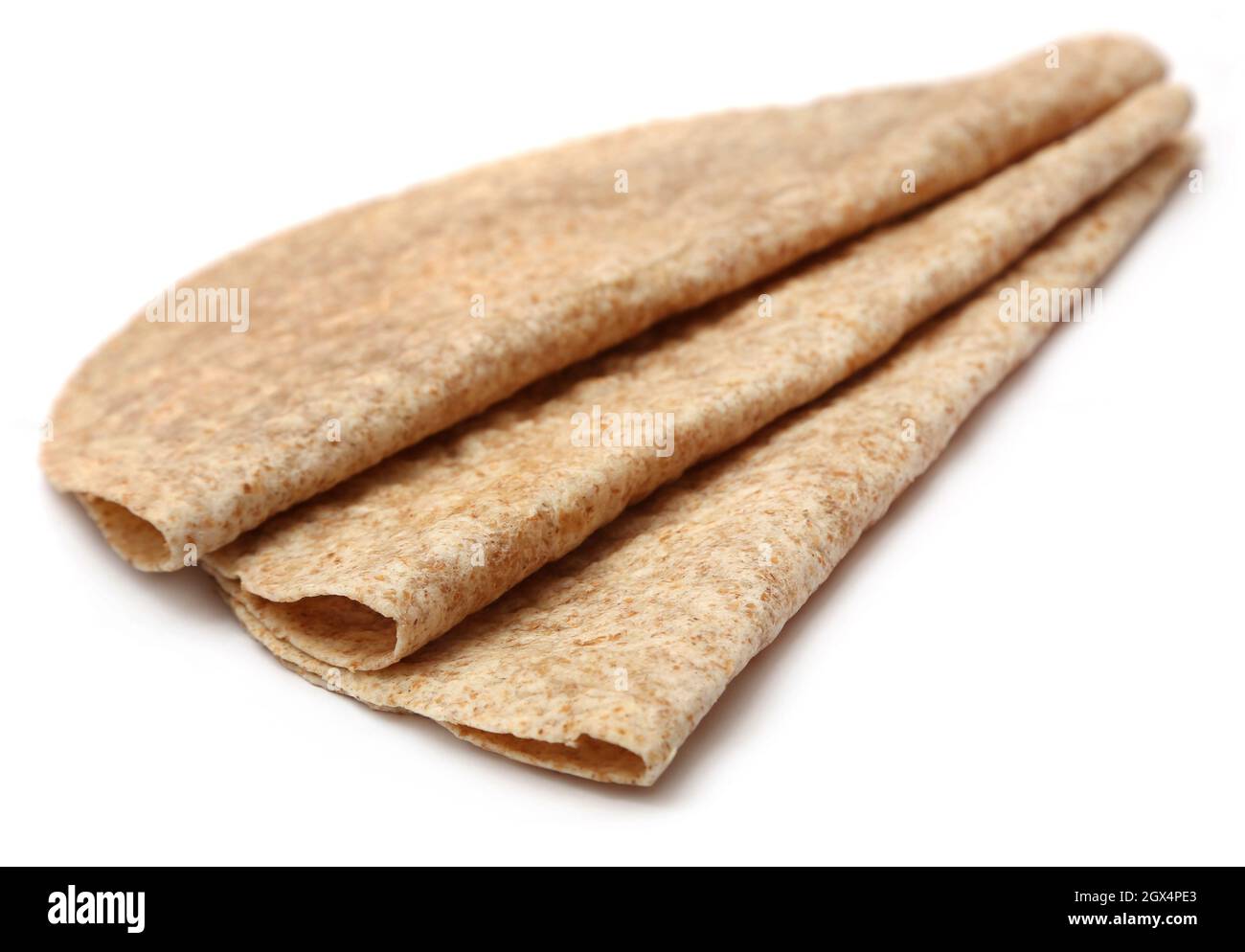 Tortilla bread isolated over white background Stock Photo - Alamy