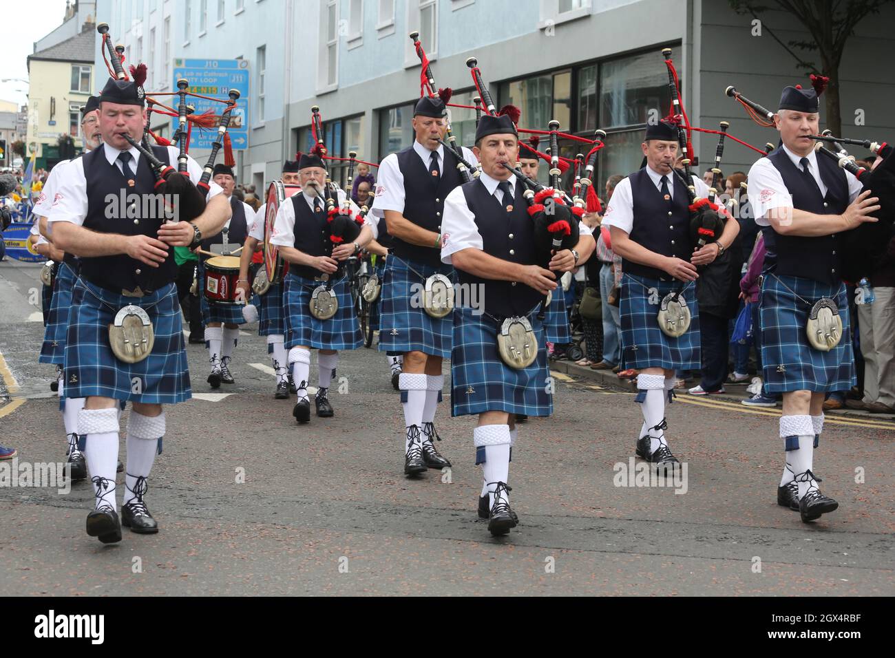 A group of traditional pipers in kilts in a section of the Sunday ...