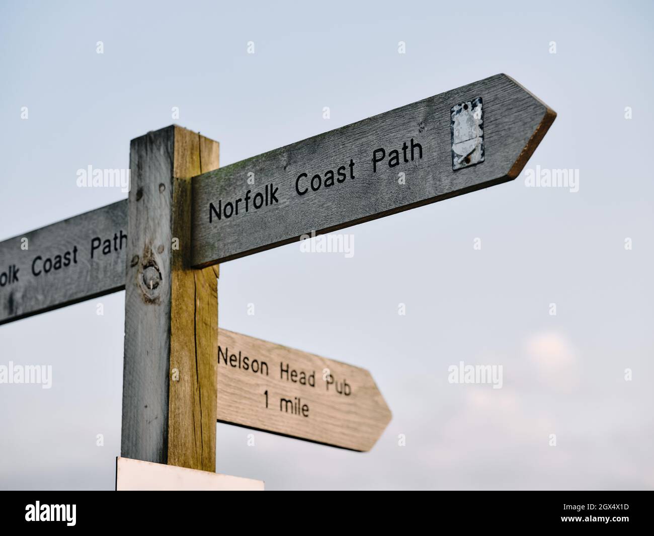 A Norfolk Coast Path directions sign in Horsey Norfolk England UK Stock ...