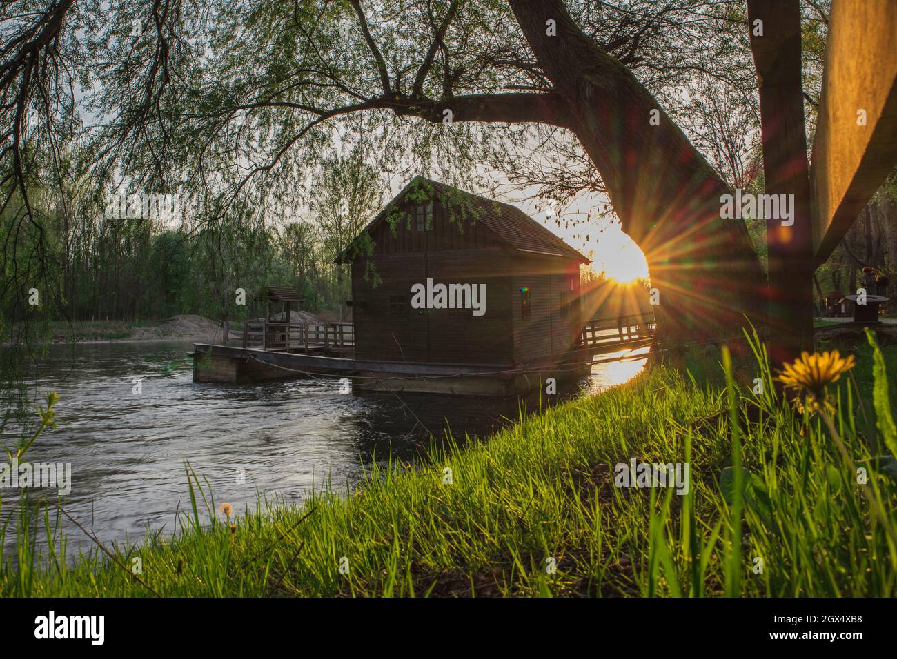 Beautiful old wooden mill on mura river or mlin na muri in the pomurje ...