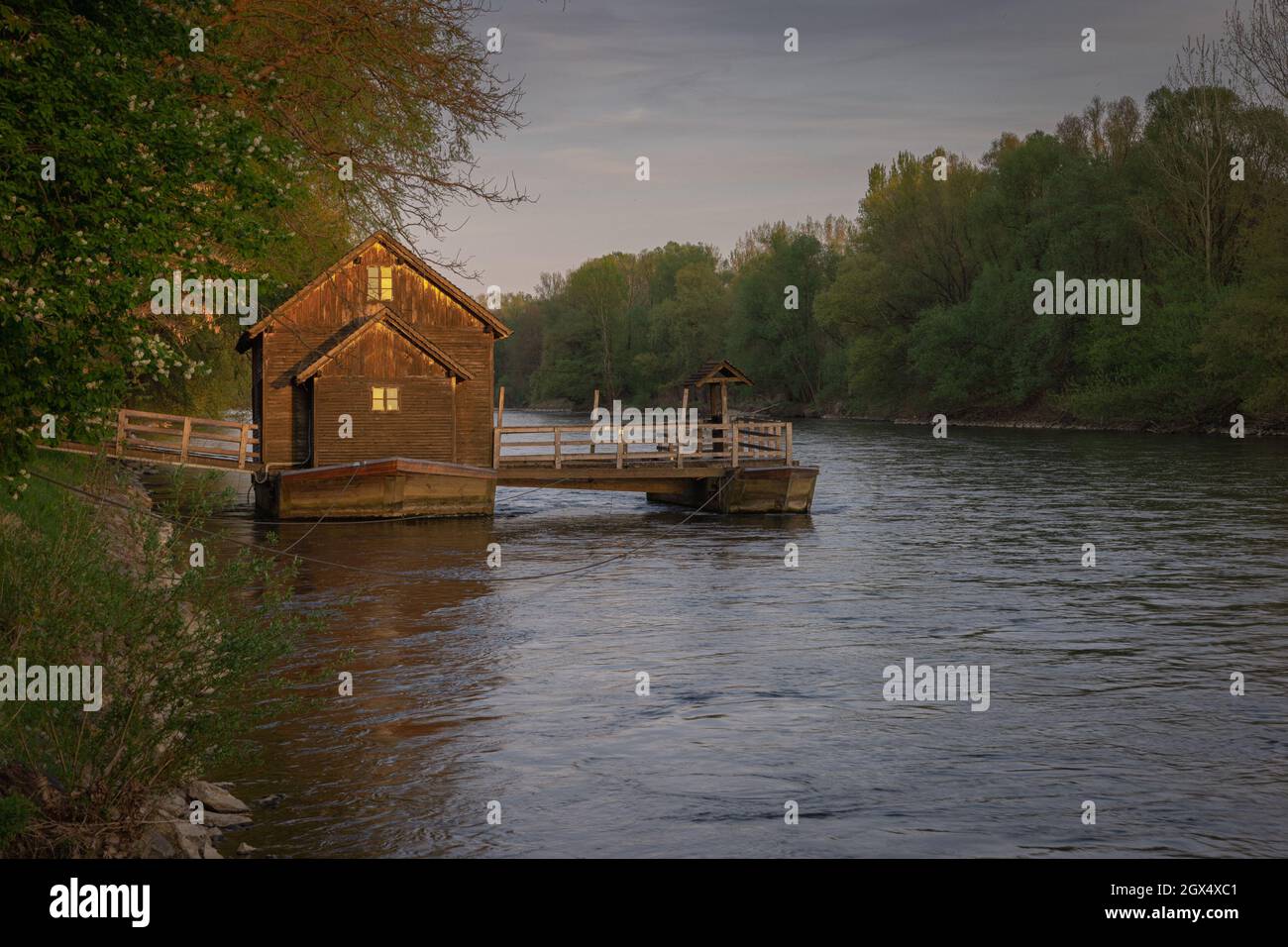 Beautiful old wooden mill on mura river or mlin na muri in the pomurje ...