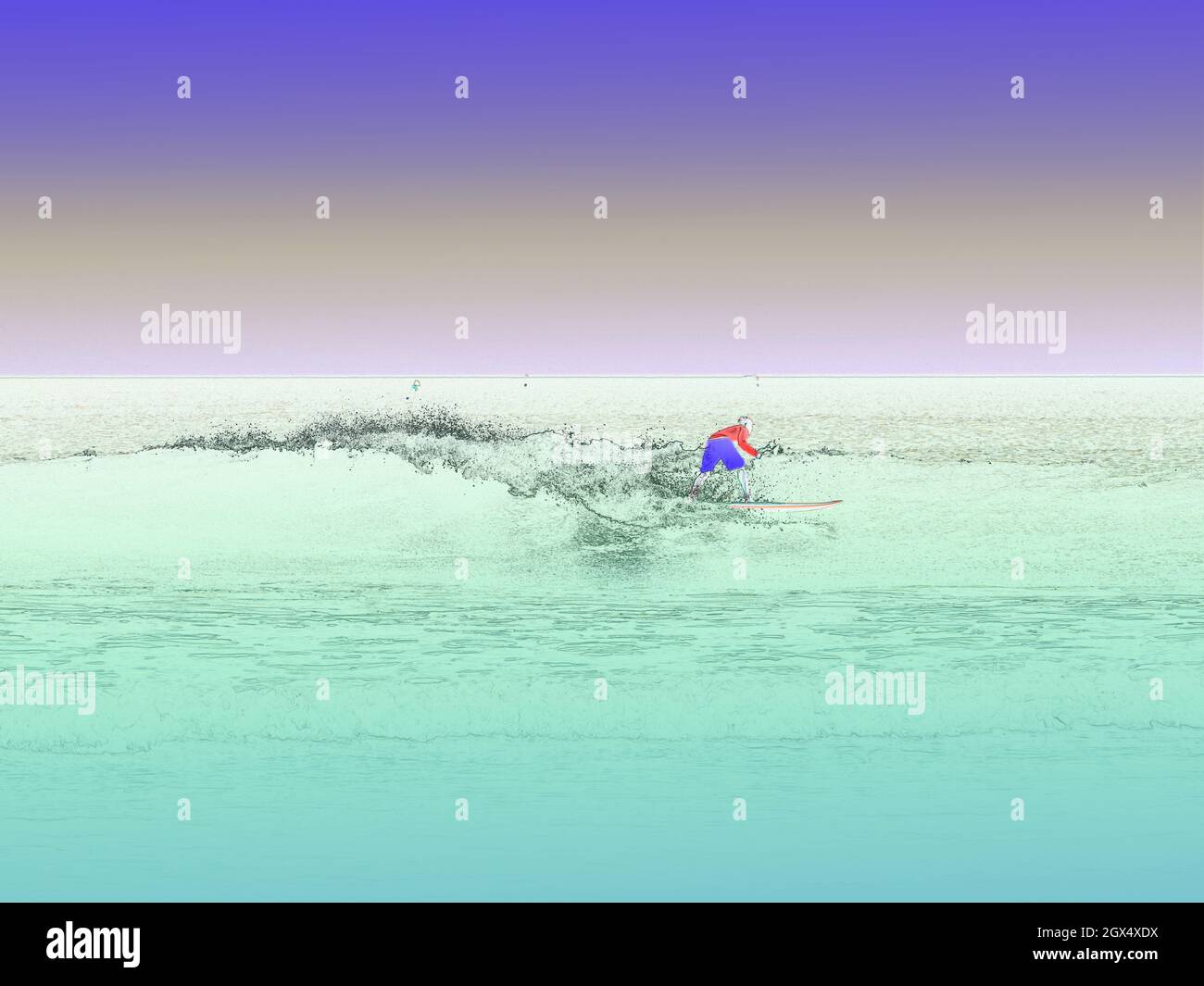 Lone surfer riding a wave left to right Stock Photo - Alamy