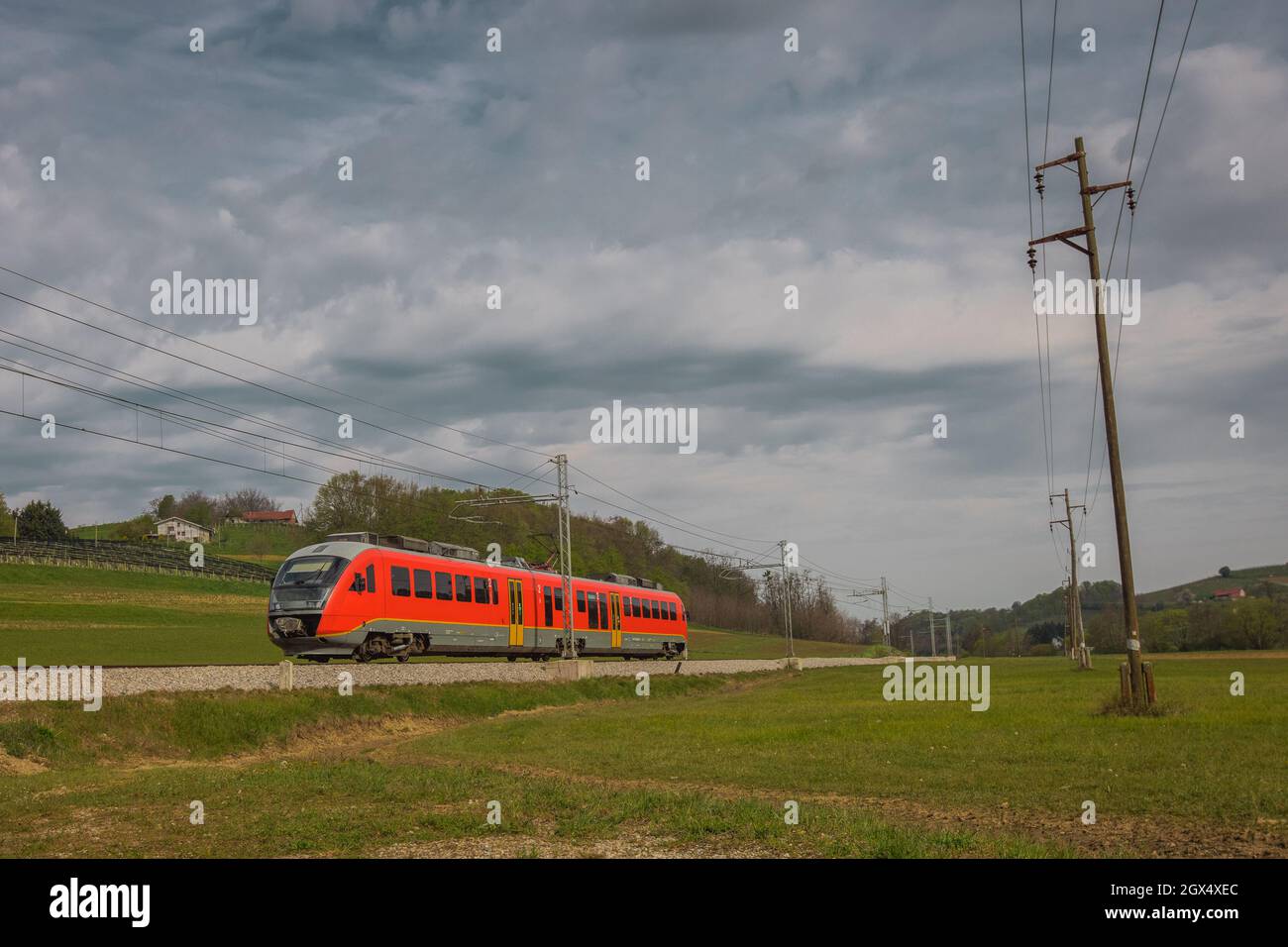 Red electric train in rural hi-res stock photography and images - Alamy
