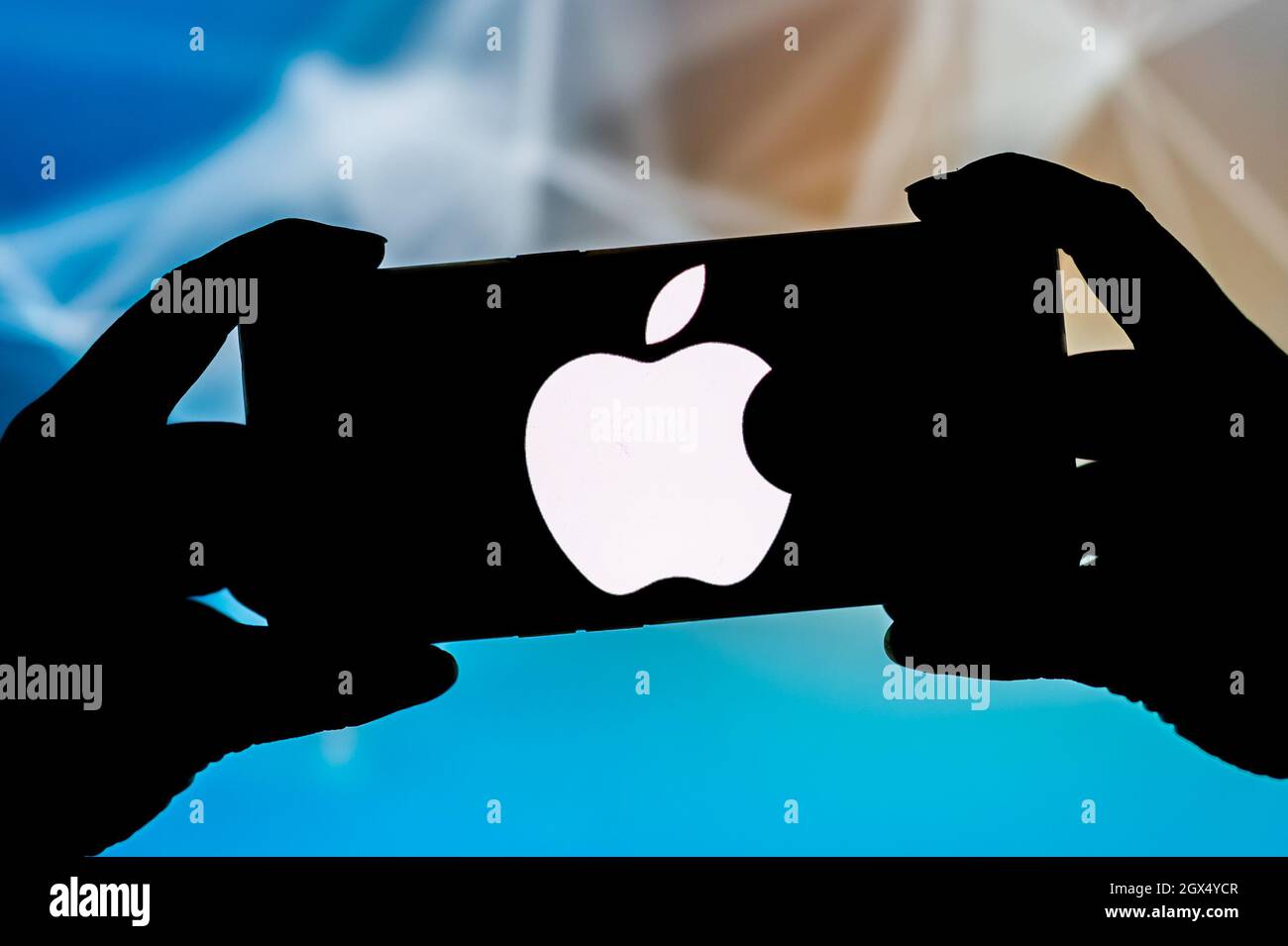 In this photo illustration an Apple logo seen displayed on a smartphone ...