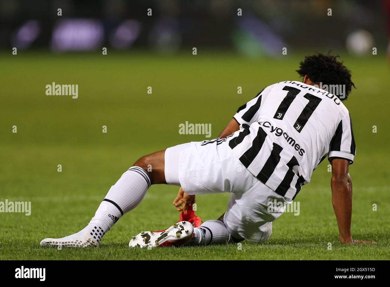 Juan Cuadrado of Juventus Fc lies on the gro, during the Serie A match ...