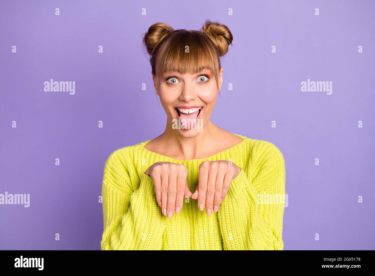 Close-up portrait of lovely funky cheerful girl grimacing fooling like ...