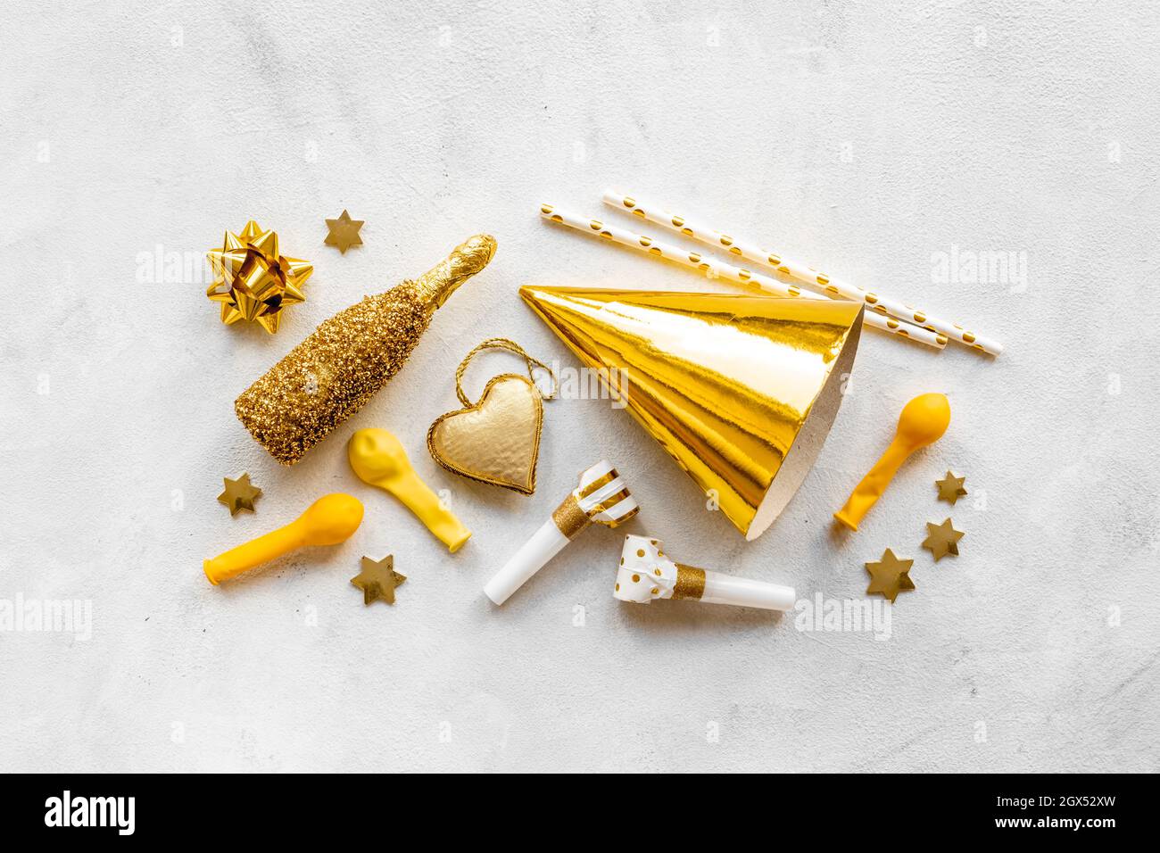Birthday party layout with golden decor top view Stock Photo - Alamy