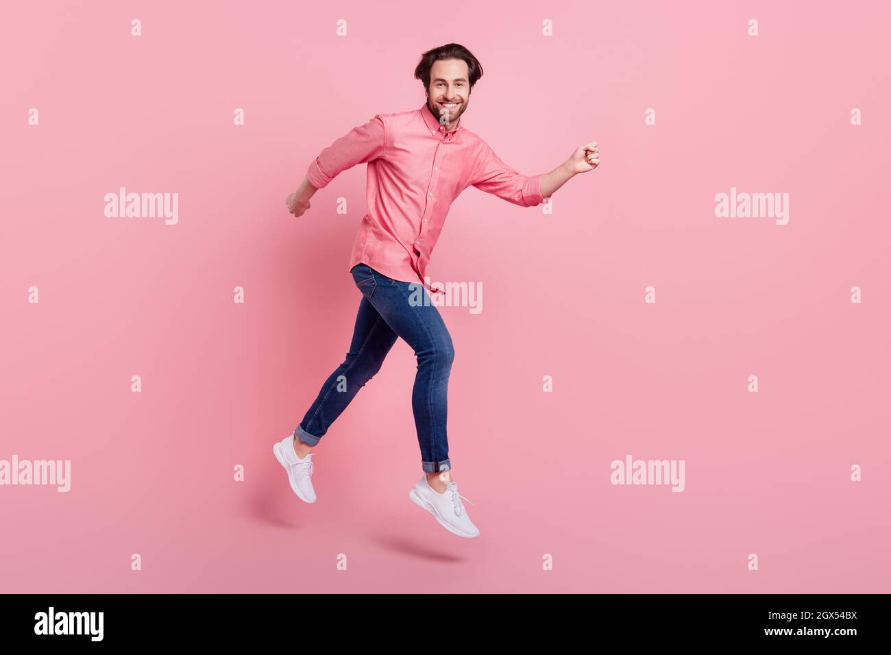 Full length photo of charming young happy man jump up run sale good ...