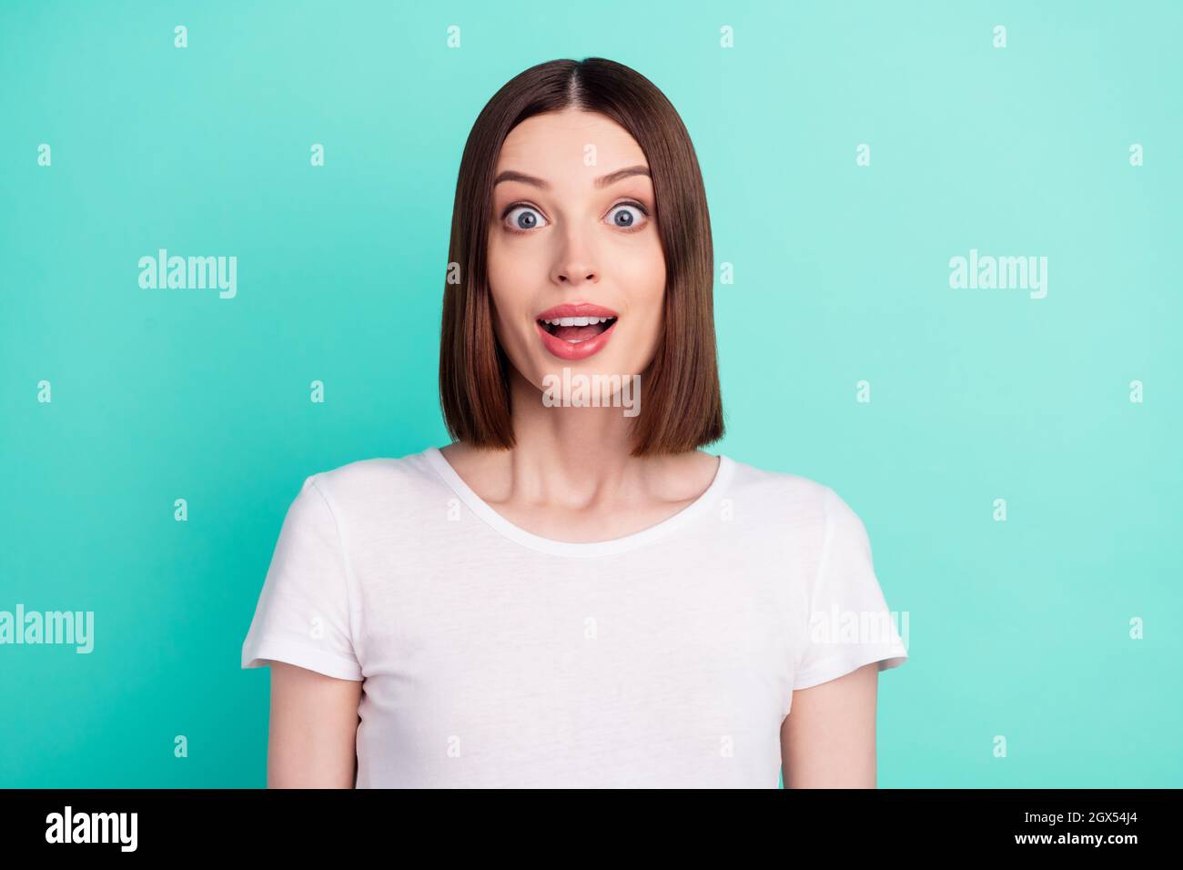 Portrait of attractive cheerful amazed girl sudden news reaction ...