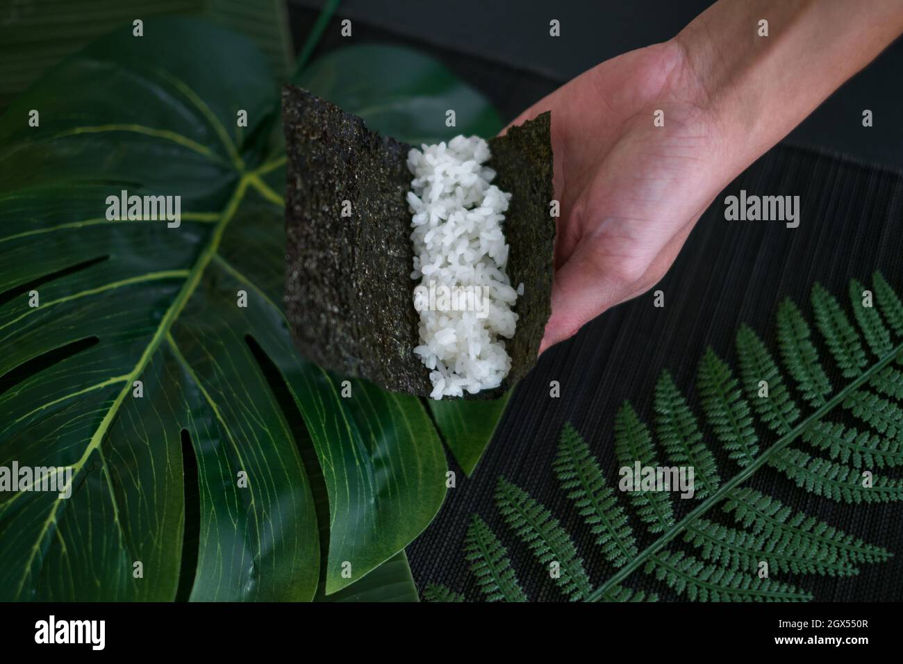 The process of making and decorating tuna Temaki Hand Roll. Hand ...