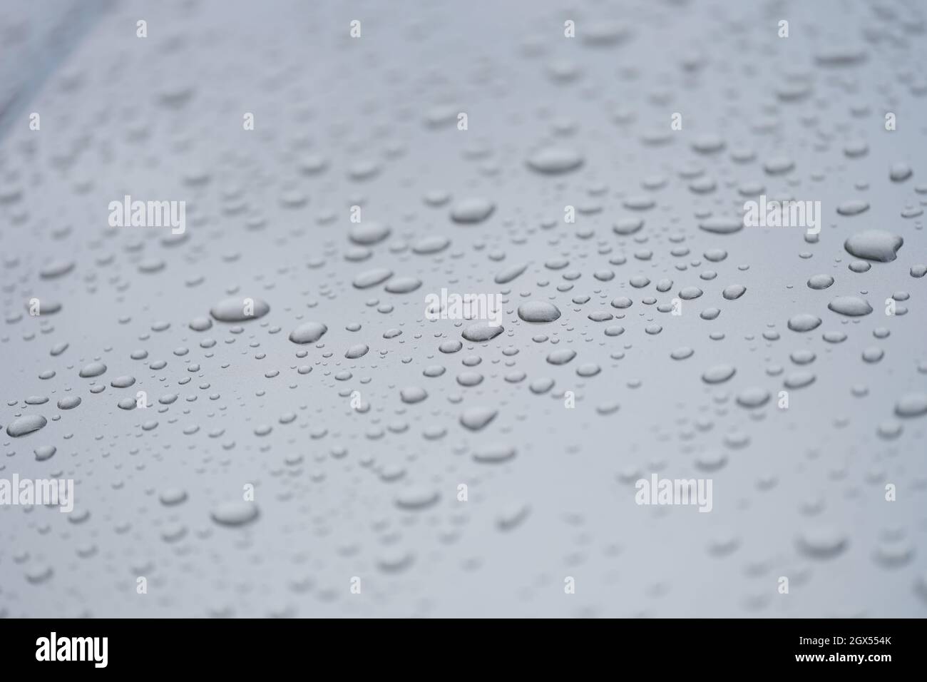 Closeup of drops on dark glass car background Stock Photo - Alamy