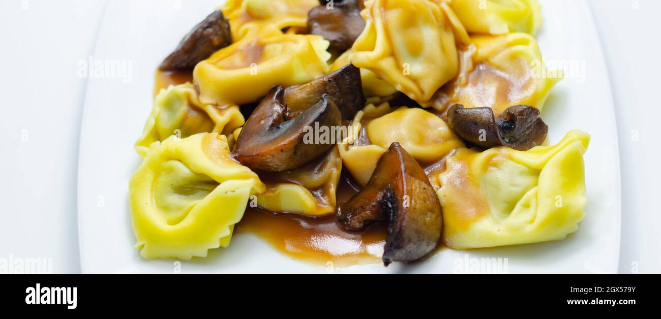 Fresh egg pasta with ricotta cheese and porcini mushrooms paste filling ...