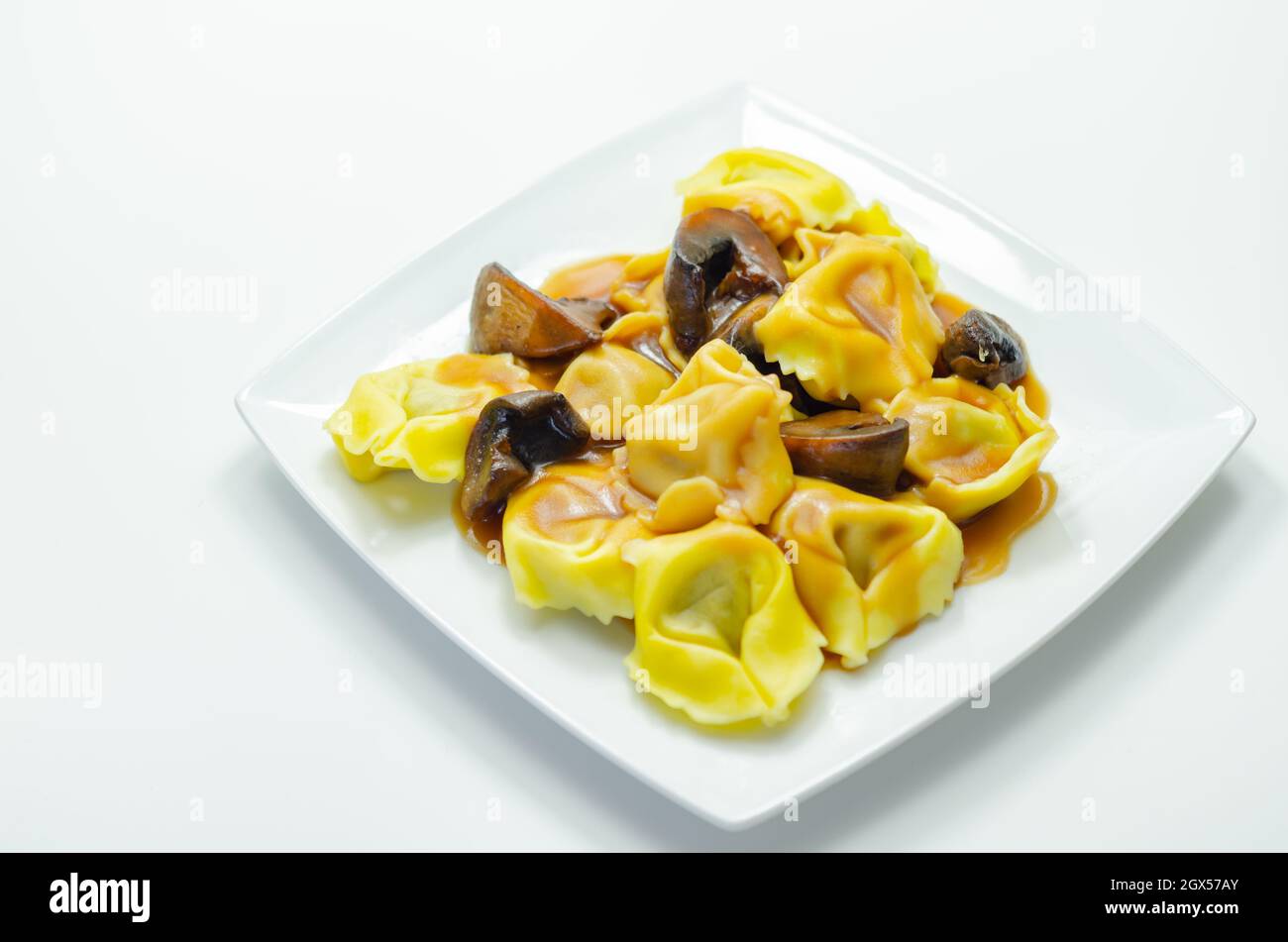 Fresh egg pasta with ricotta cheese and porcini mushrooms paste filling ...