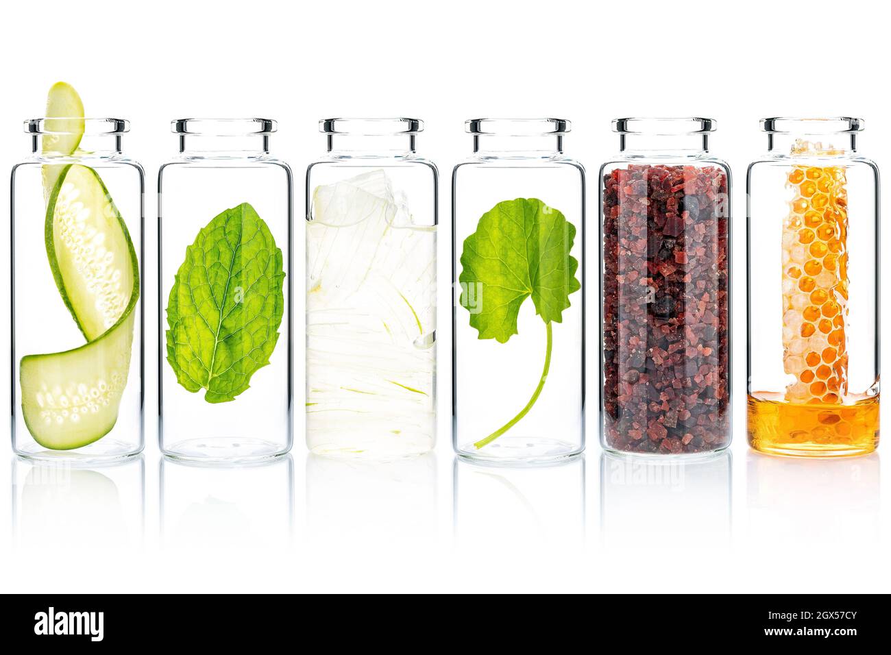 Homemade skin care with natural ingredients in glass bottles isolated ...