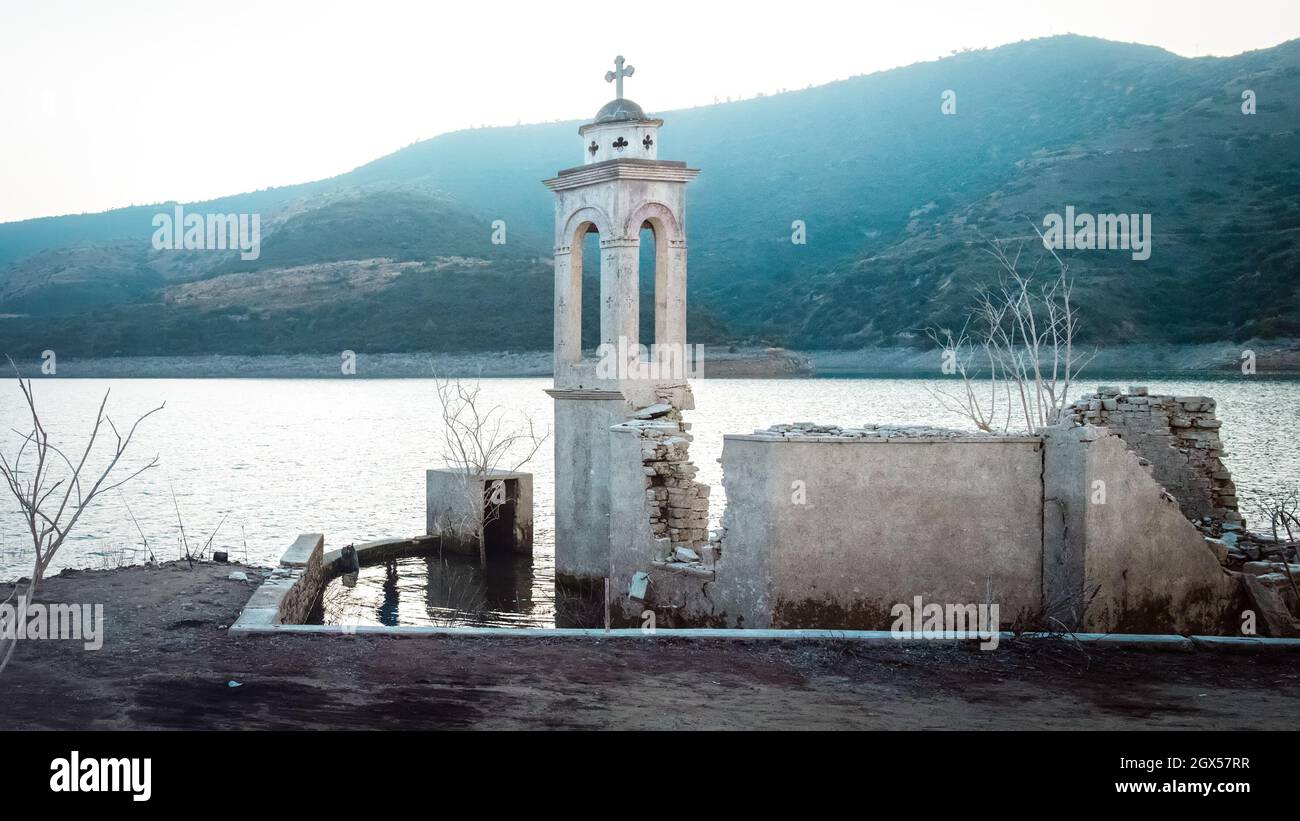 Ruined old church in Alassa, Cyprus is submerged under the water of ...