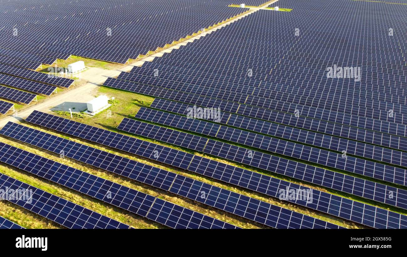 Aerial drone view flight over solar power station panels Stock Photo ...