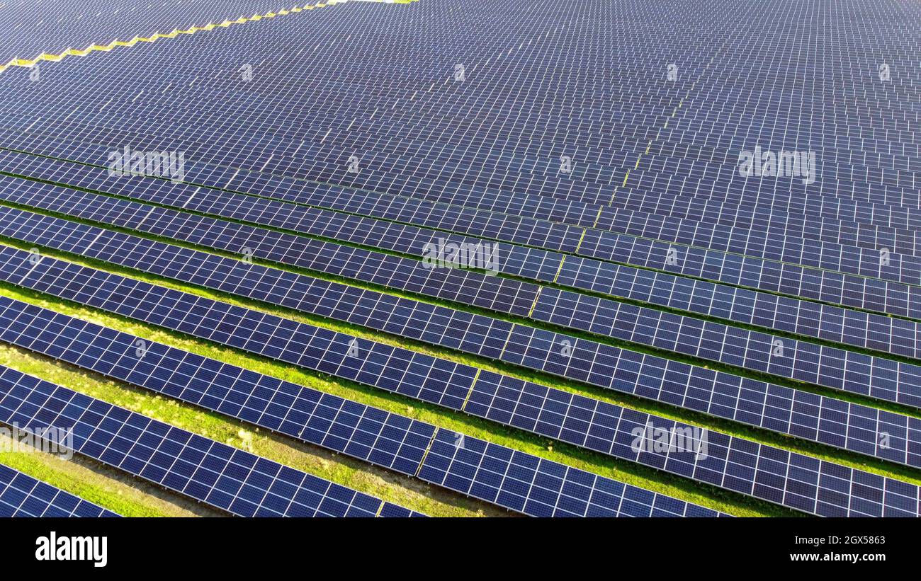 Aerial drone view flight over solar power station panels Stock Photo ...