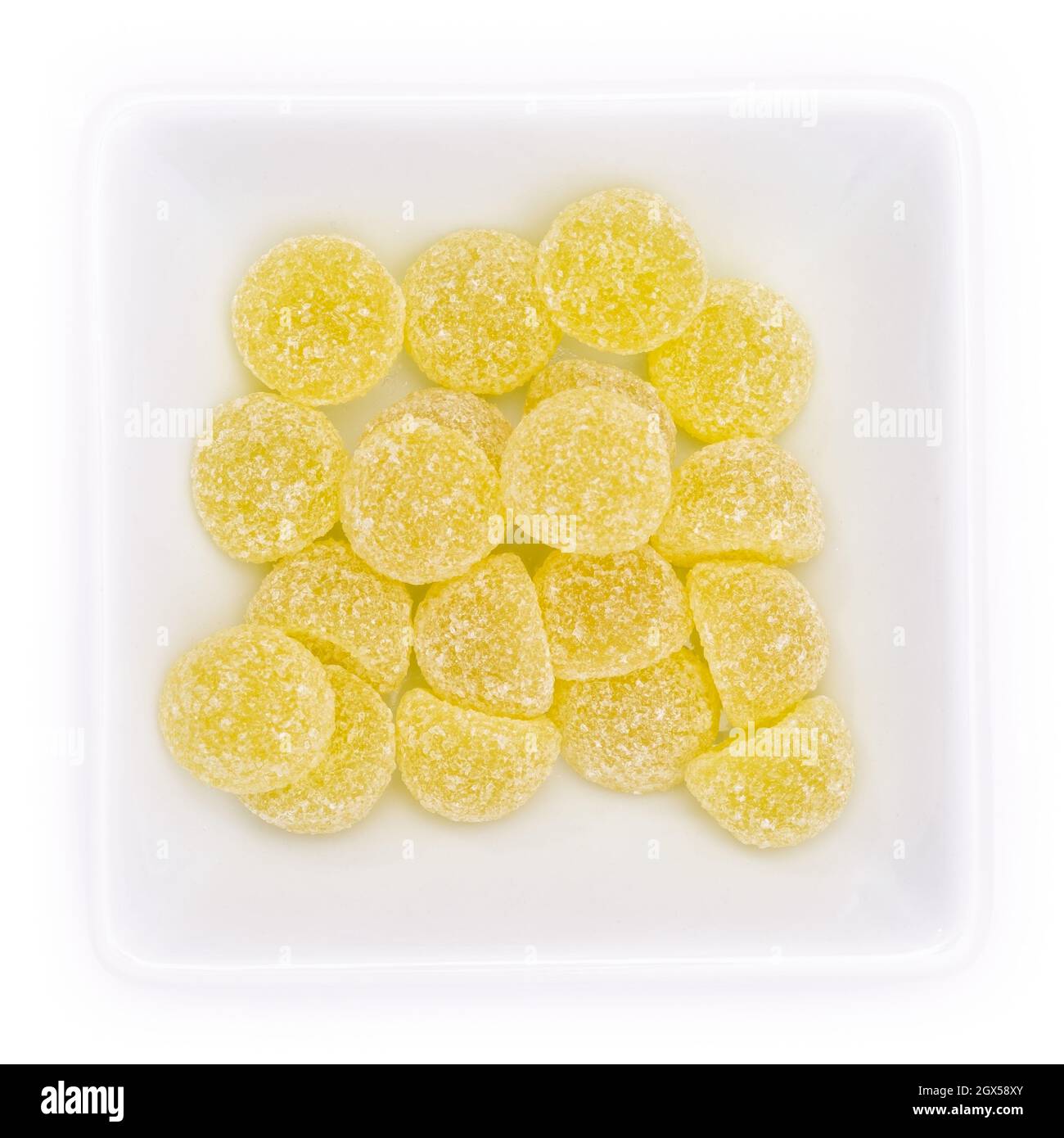 Top view of yellow gum drops with lemon aroma in a bowl Stock Photo - Alamy