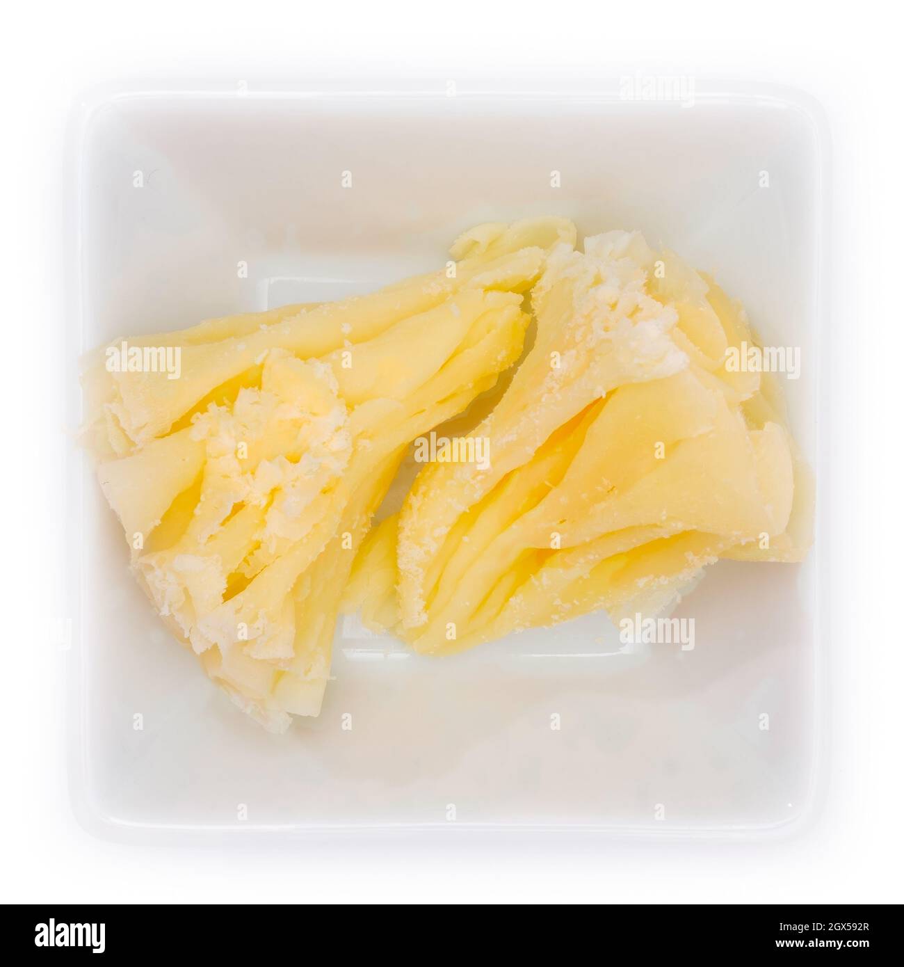 Top view of a Tete de moine cheese as rosette in a bowl Stock Photo - Alamy