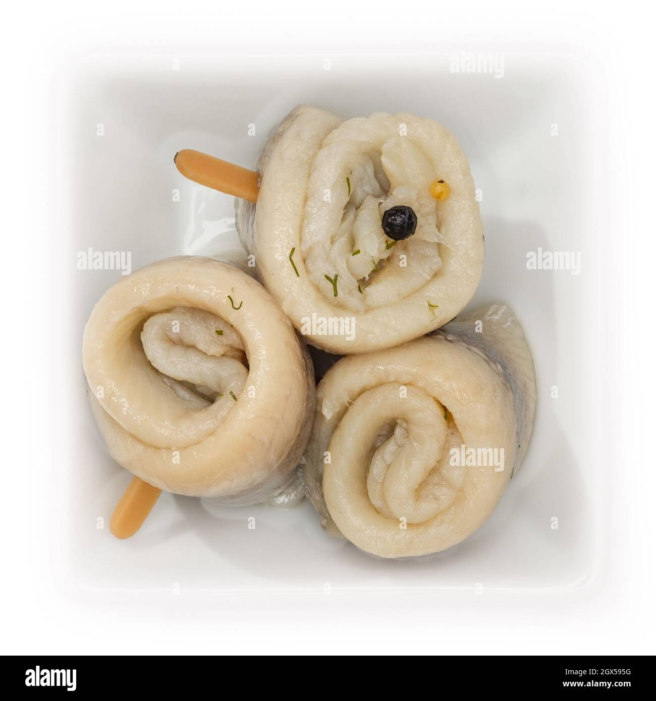 Top view of rollmops herring fish in a bowl Stock Photo - Alamy