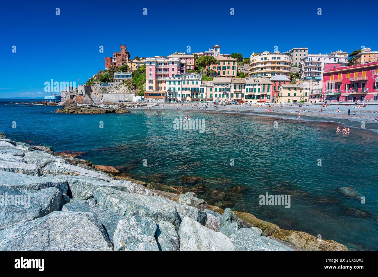 Beach, cliff and fishing village of Vernazzola near the center of Genoa ...