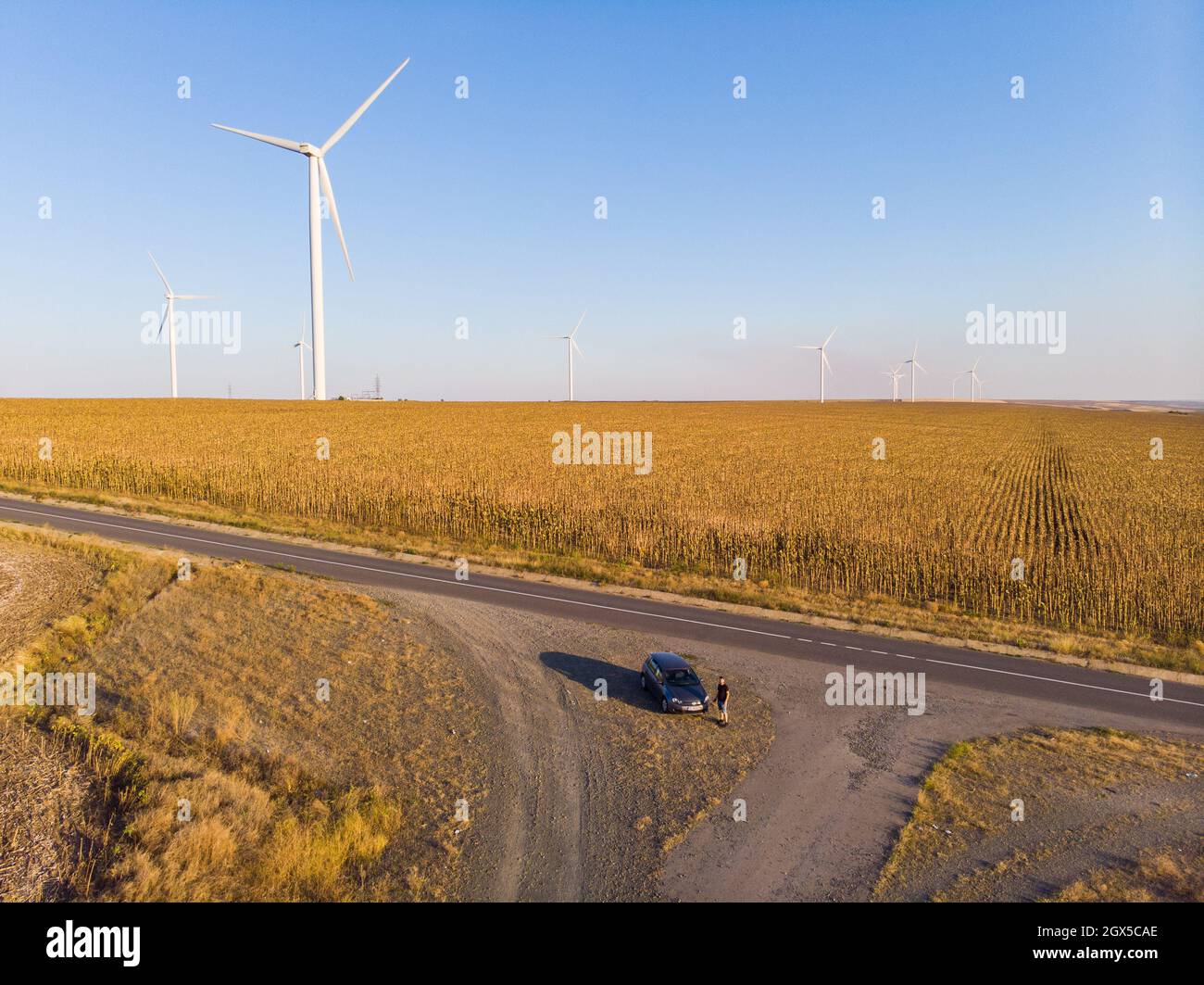 Aerial drone view of a windmill by the sunset Stock Photo - Alamy