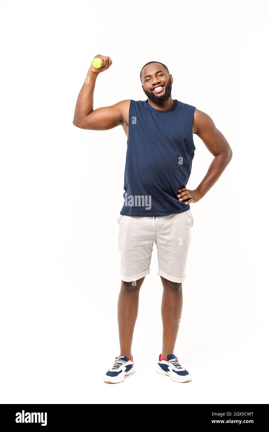 Young fitness african black man in sport wear cheering carefree and ...
