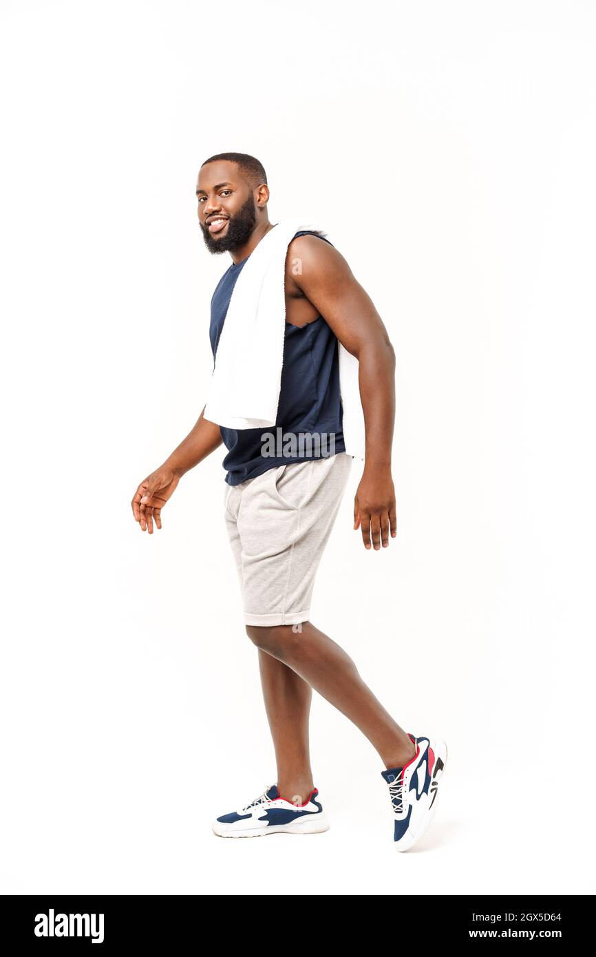 Young fitness african black man in sport wear cheering carefree ...