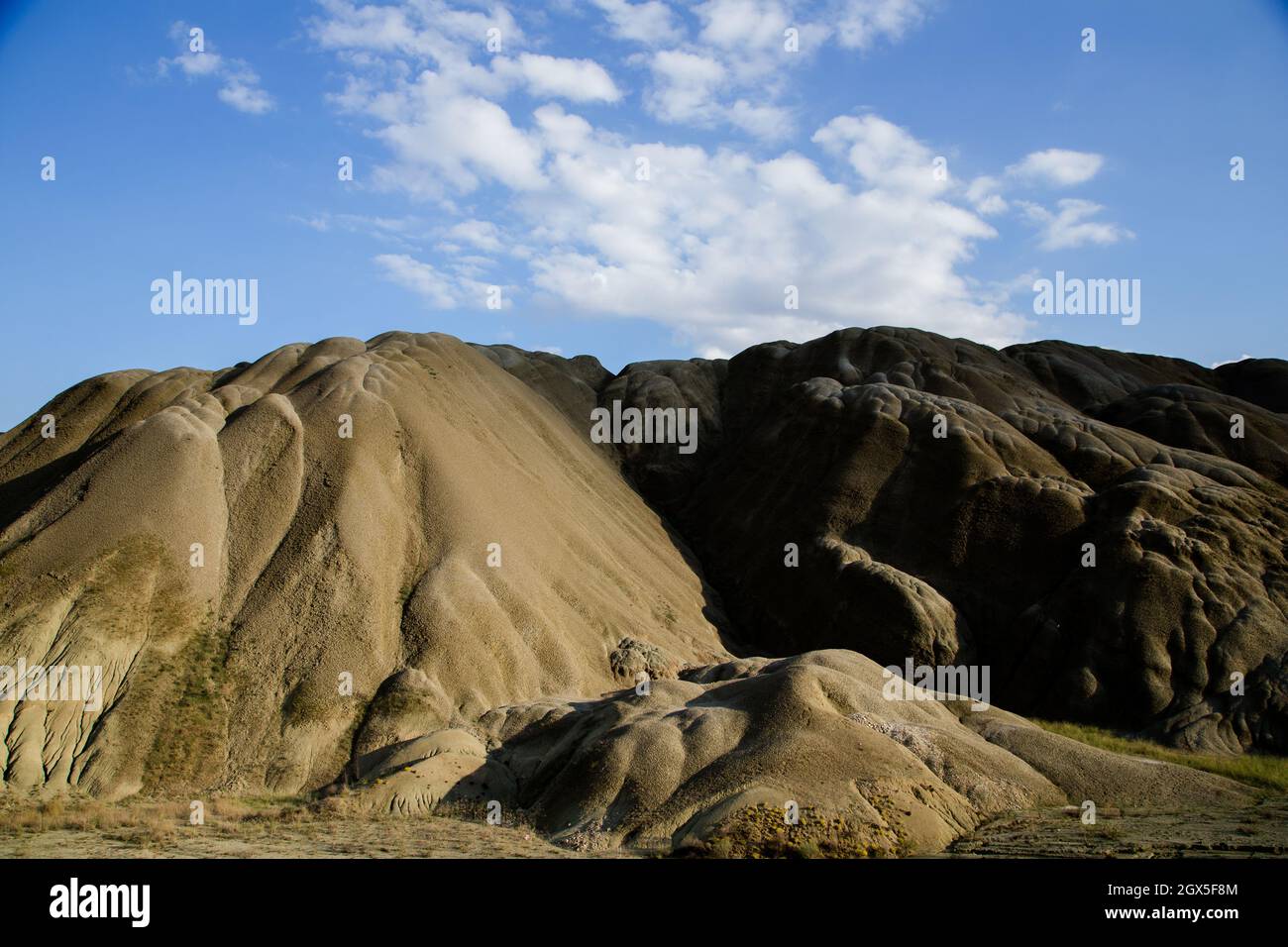 Blue sky with colorful natural mountain patterns Stock Photo - Alamy