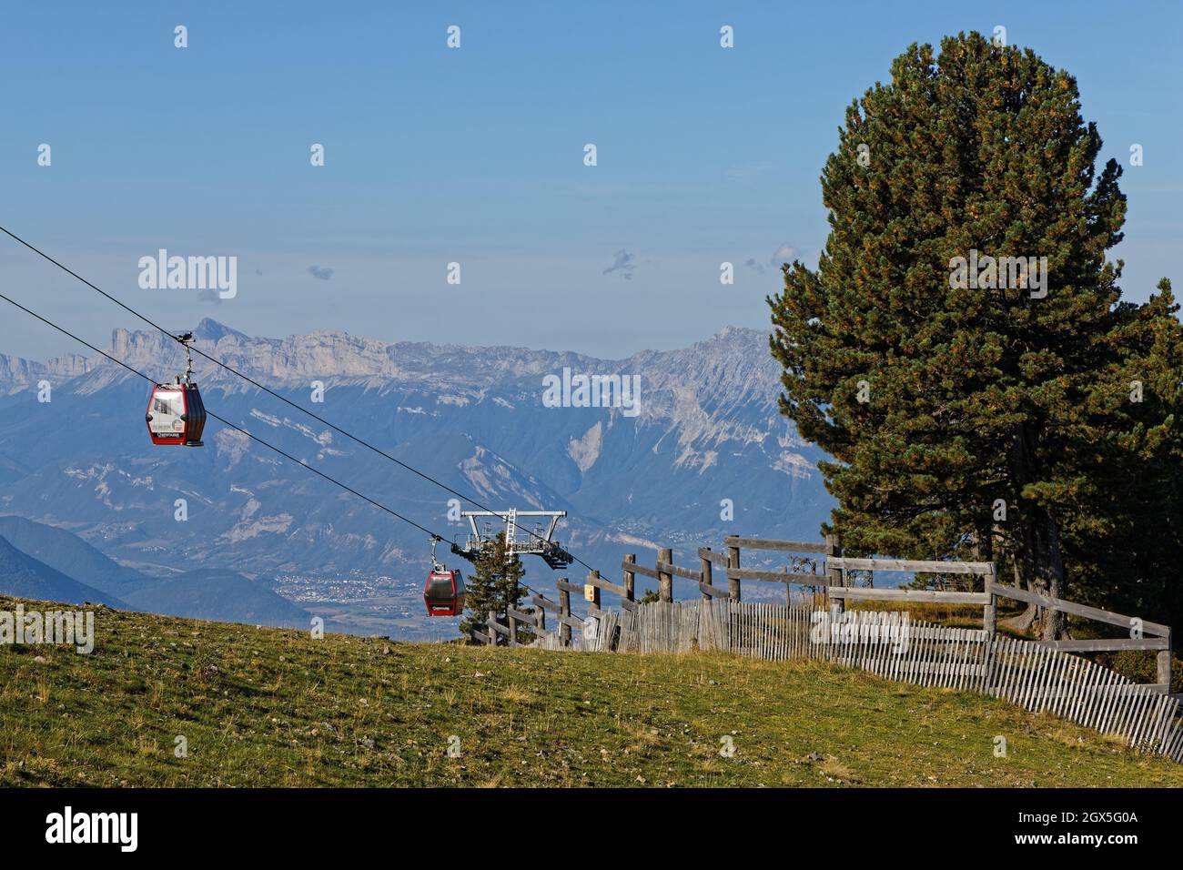CHAMROUSSE, FRANCE, September 13, 2021 : Red cabins of the cable-car of ...