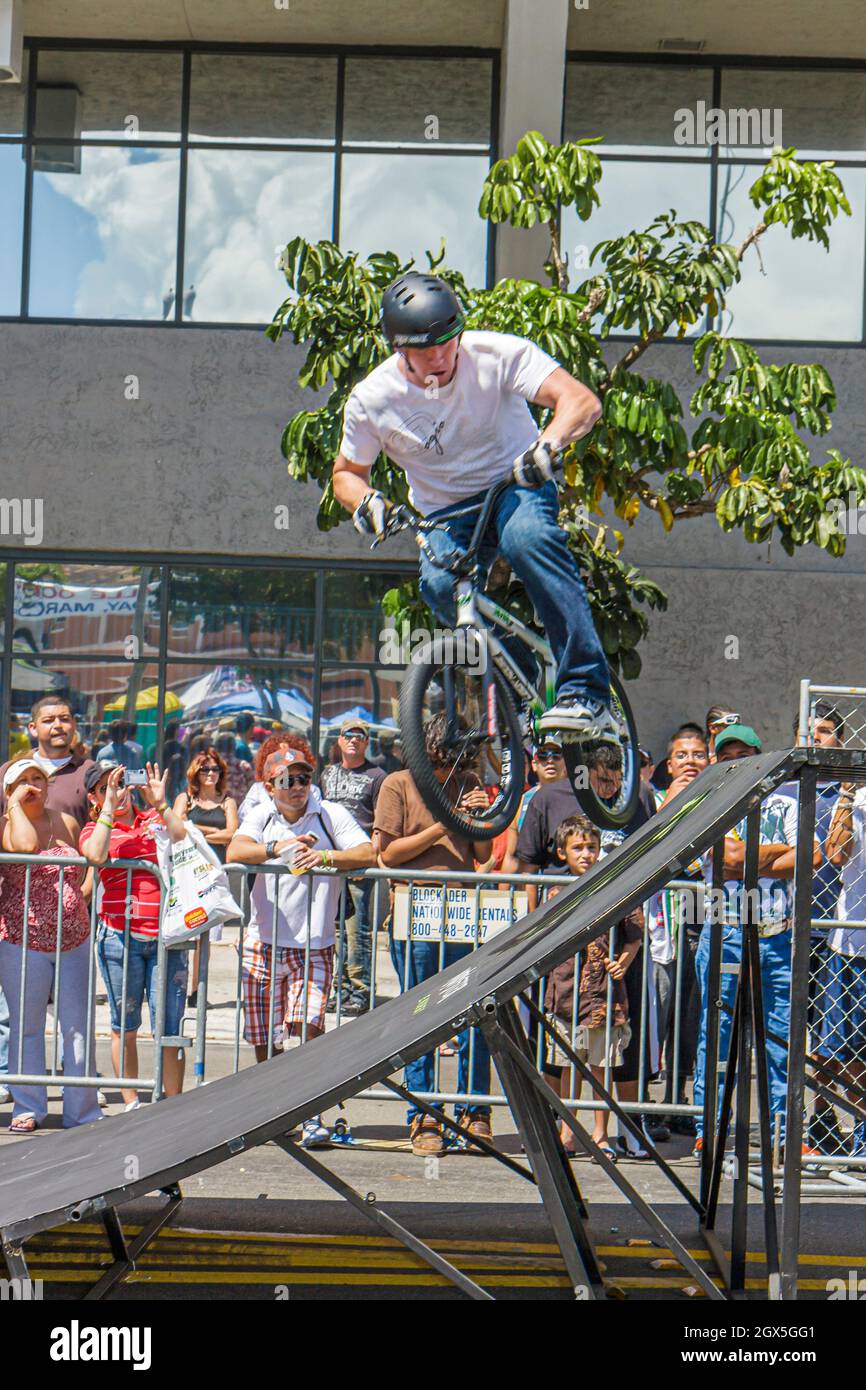 Hispanic man rider crowd performing bicycle bmx ramp trick stunt hi-res ...