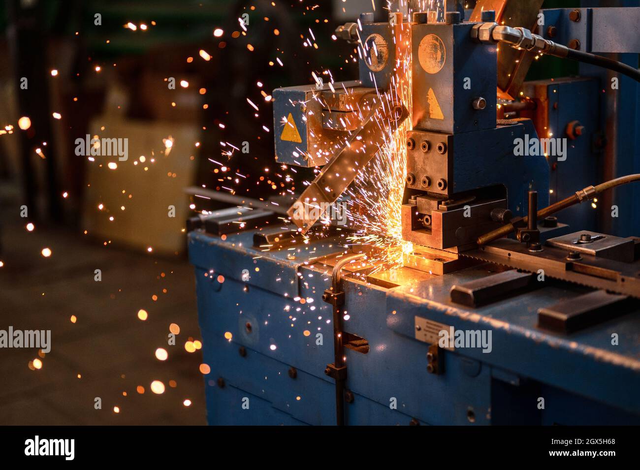 Automatic welding machine in operation, many bright sparks Stock Photo ...