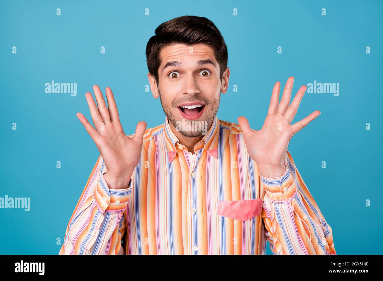 Photo Of Happy Amazed Shocked Man Raise Hands Good Mood Sale News